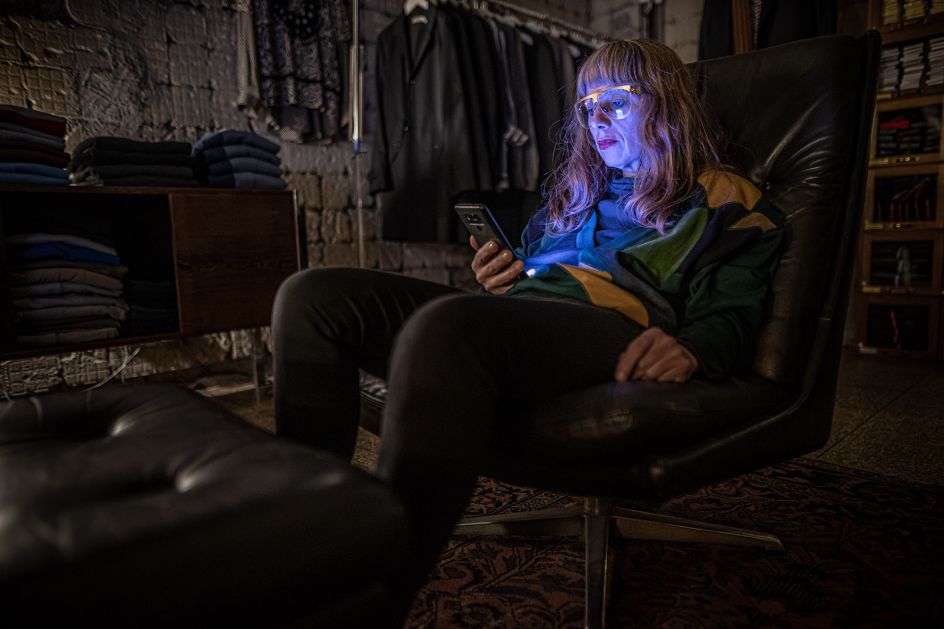 Portraits of people in lockdown with their faces illuminated by their ...