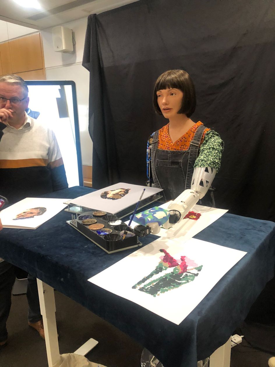 The world's first robot artist reveals amazing new paintings in its ...