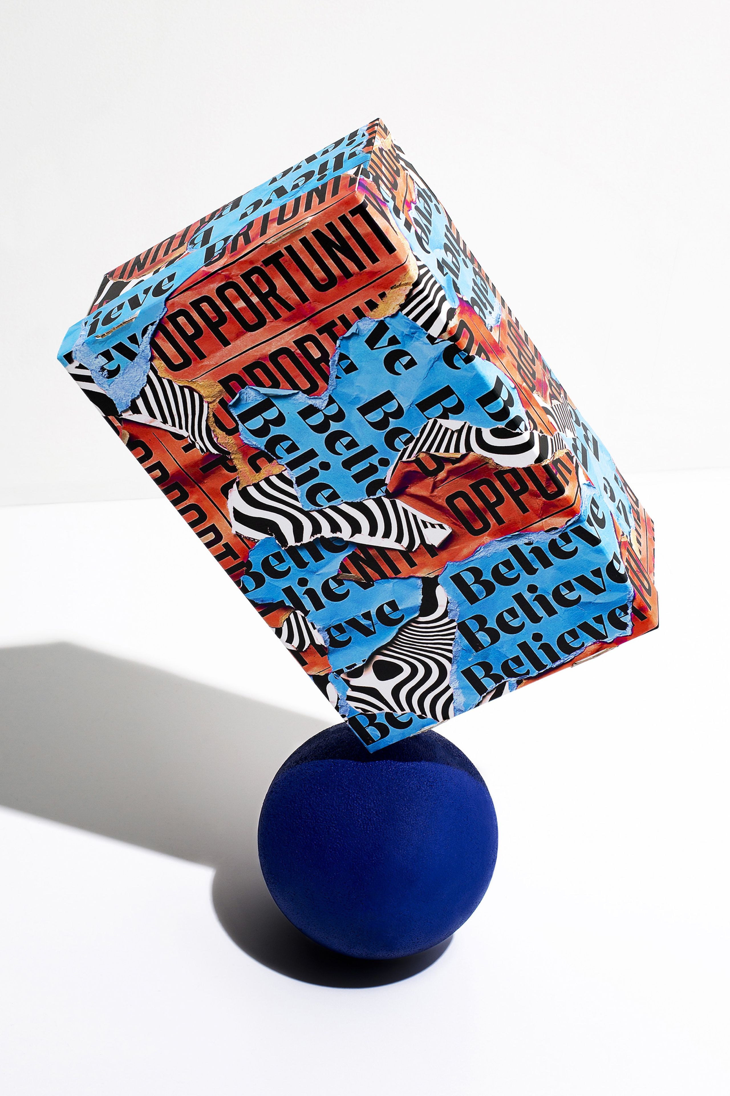 Craig Black creates typographic boxes for sports shoe charity ...