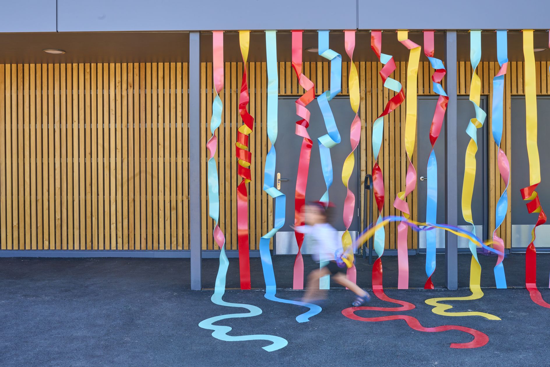A new sculpture of rainbow-coloured ribbons is amazingly made of steel ...