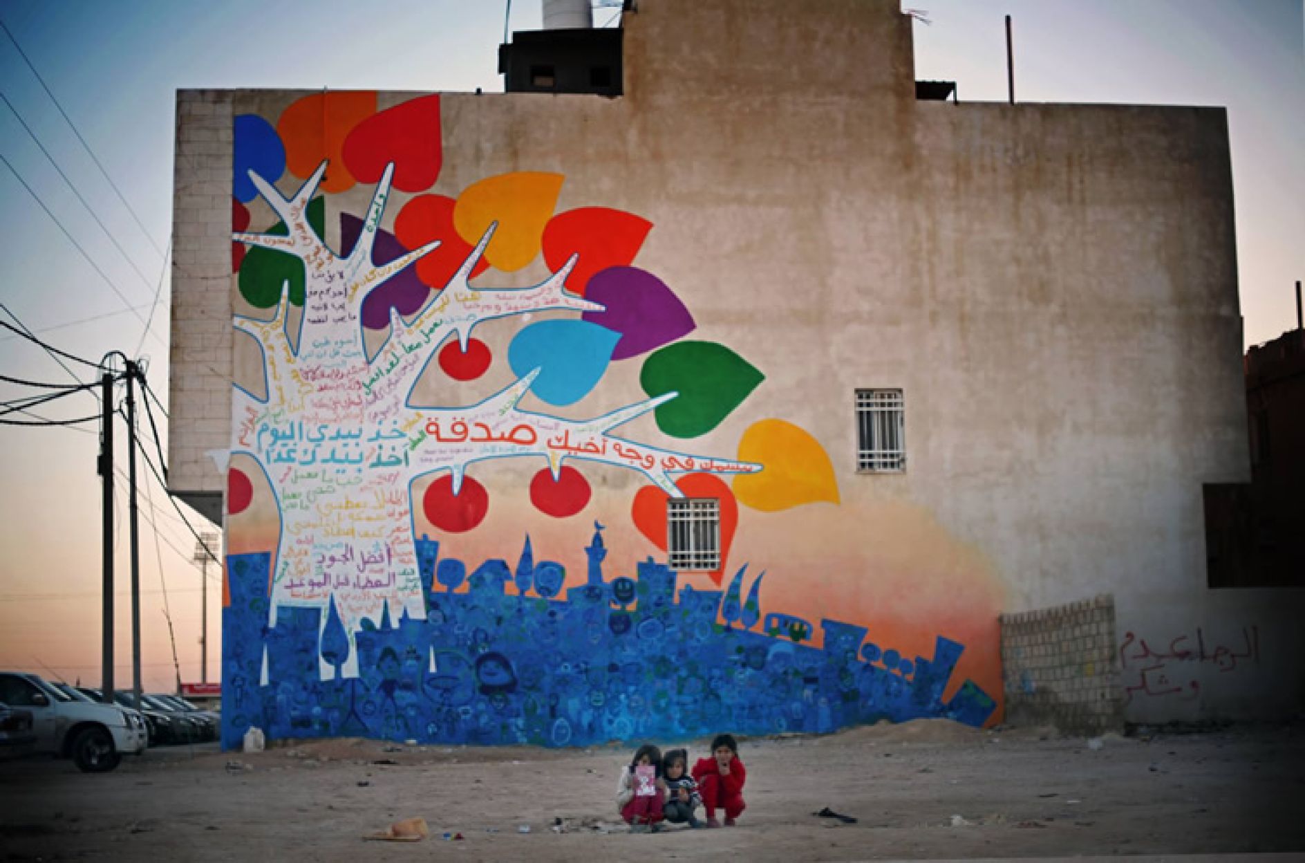 A street art project paints a brighter future for Syrian refugee camps ...