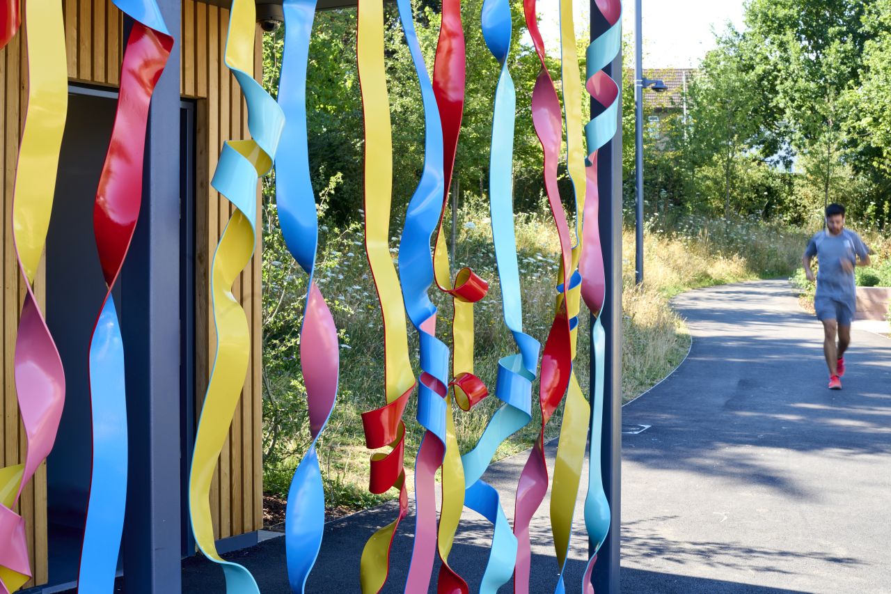 A new sculpture of rainbow-coloured ribbons is amazingly made of steel ...