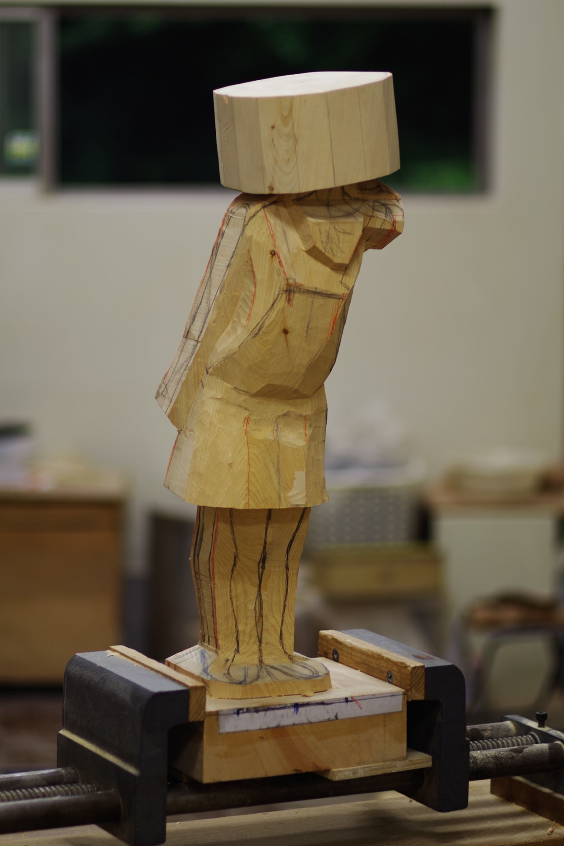 Sculptures of women carved from wooden blocks with glitch effects ...