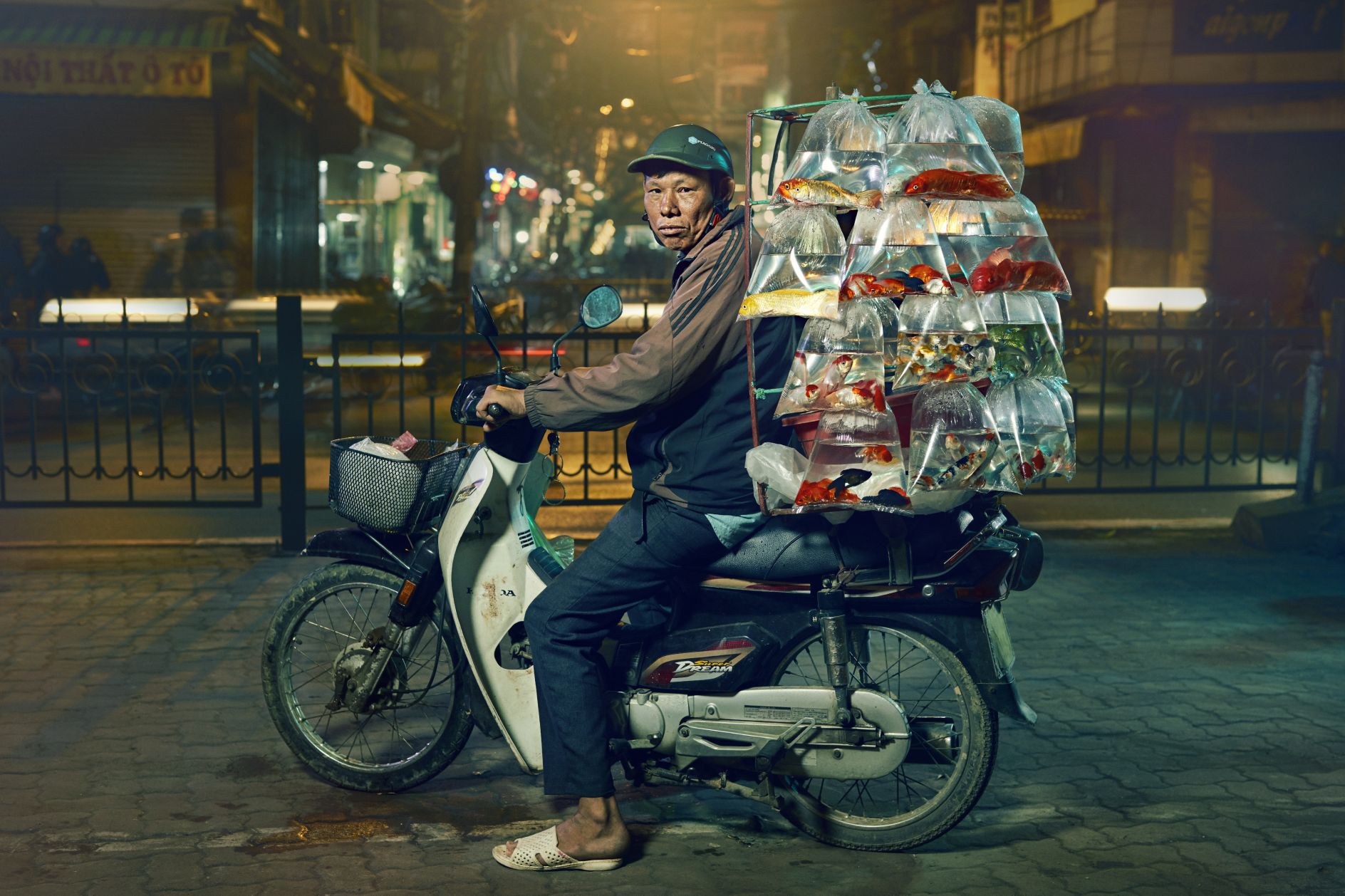 Photographs that show the inventive ways people use mopeds in Vietnam's ...