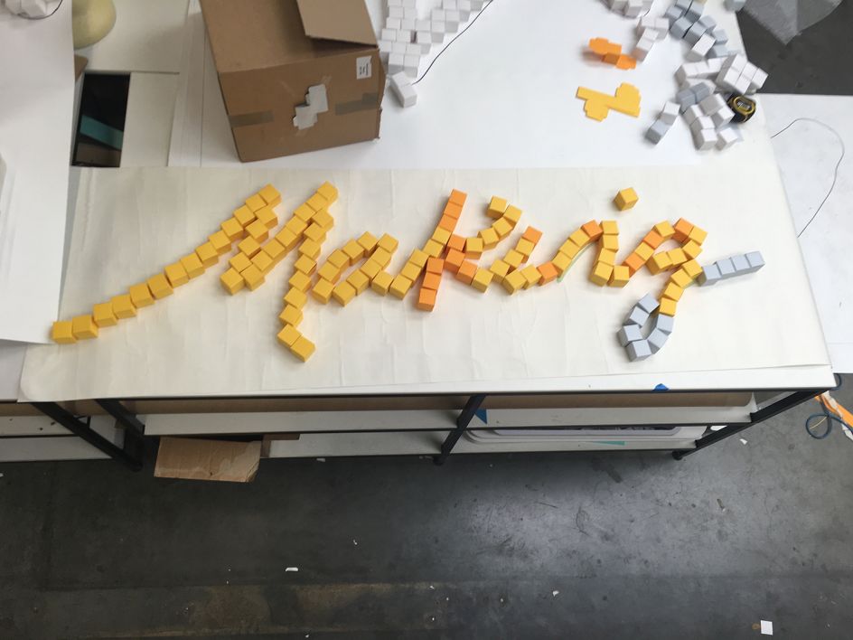 Giant 3D hand sculptures made entirely from 35,000 handmade paper cubes ...