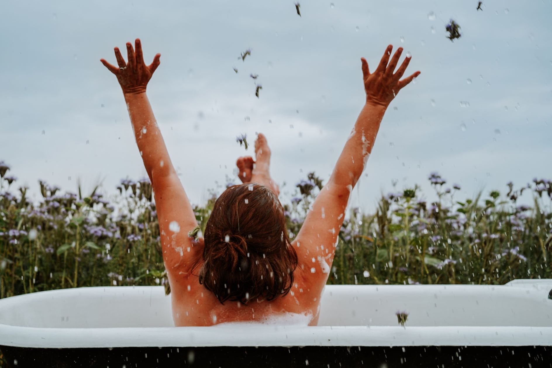 Photographs by Corin Jones of women bathing outside in nature in ...