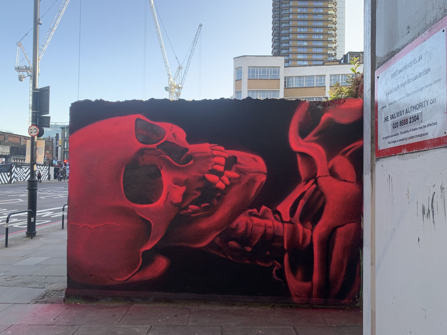 Artist David Speed paints 100 neon portraits on a Shoreditch rooftop ...