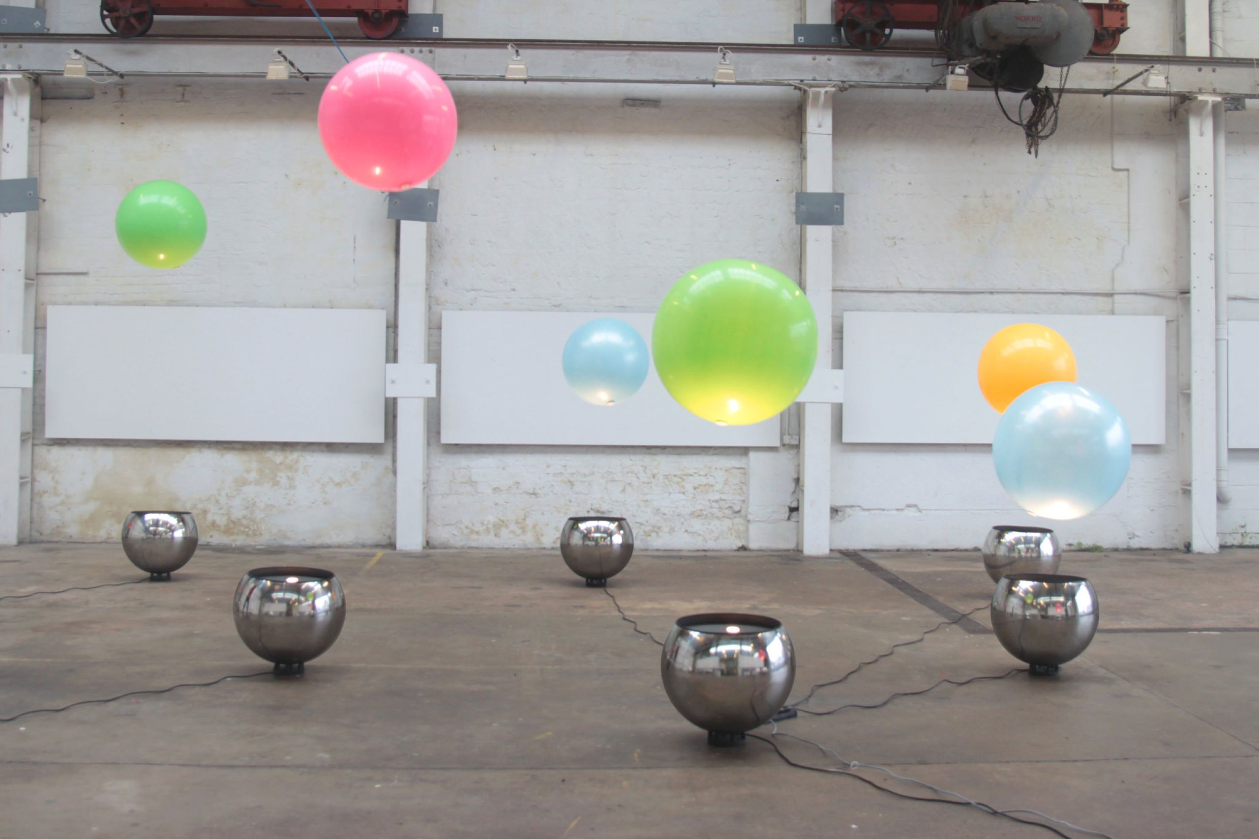 Interactive installation that lets you play with giant colourful orbs ...