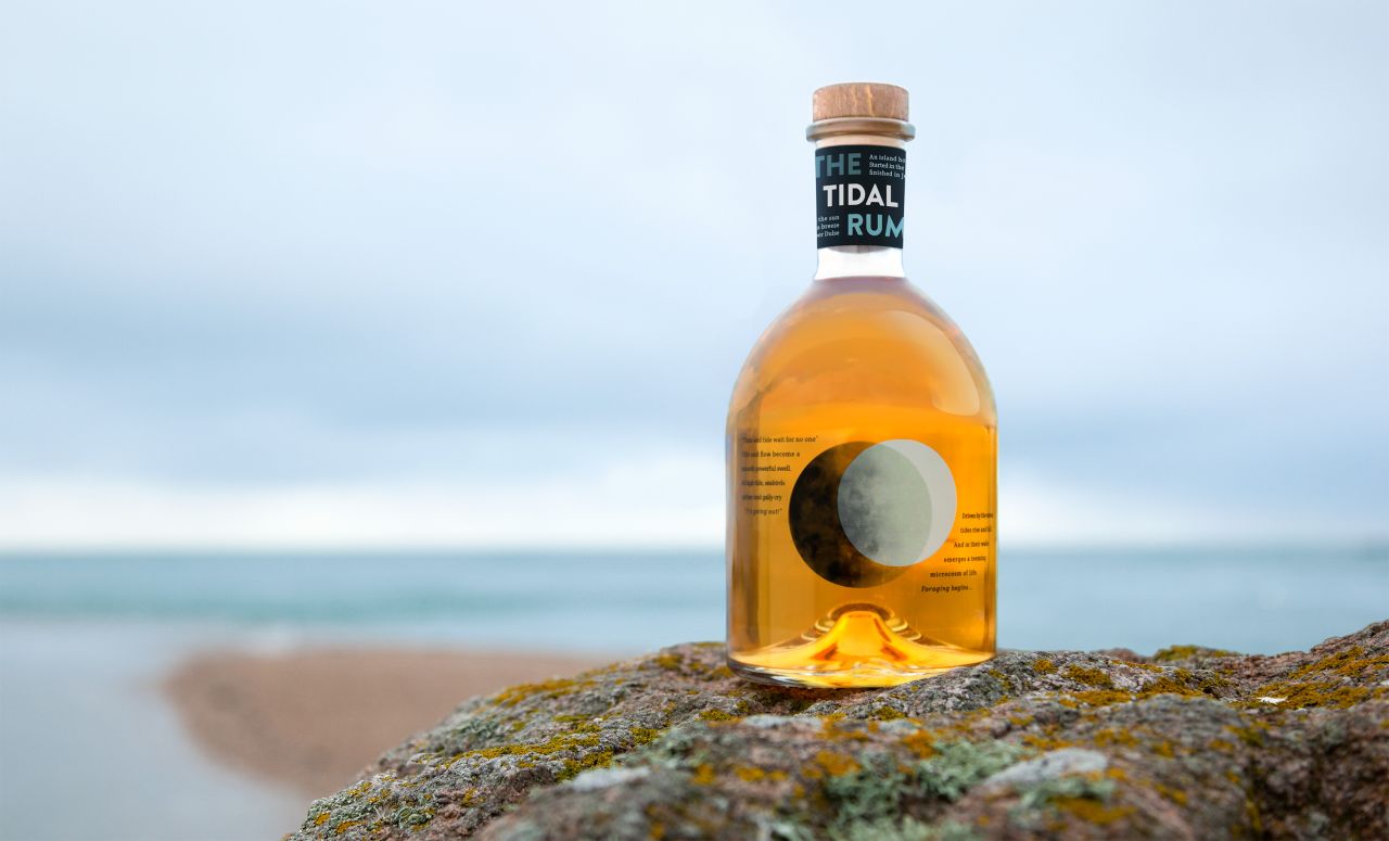 Lewis Moberly designs a bottle 'kissed by the tide' for Tidal Rum ...