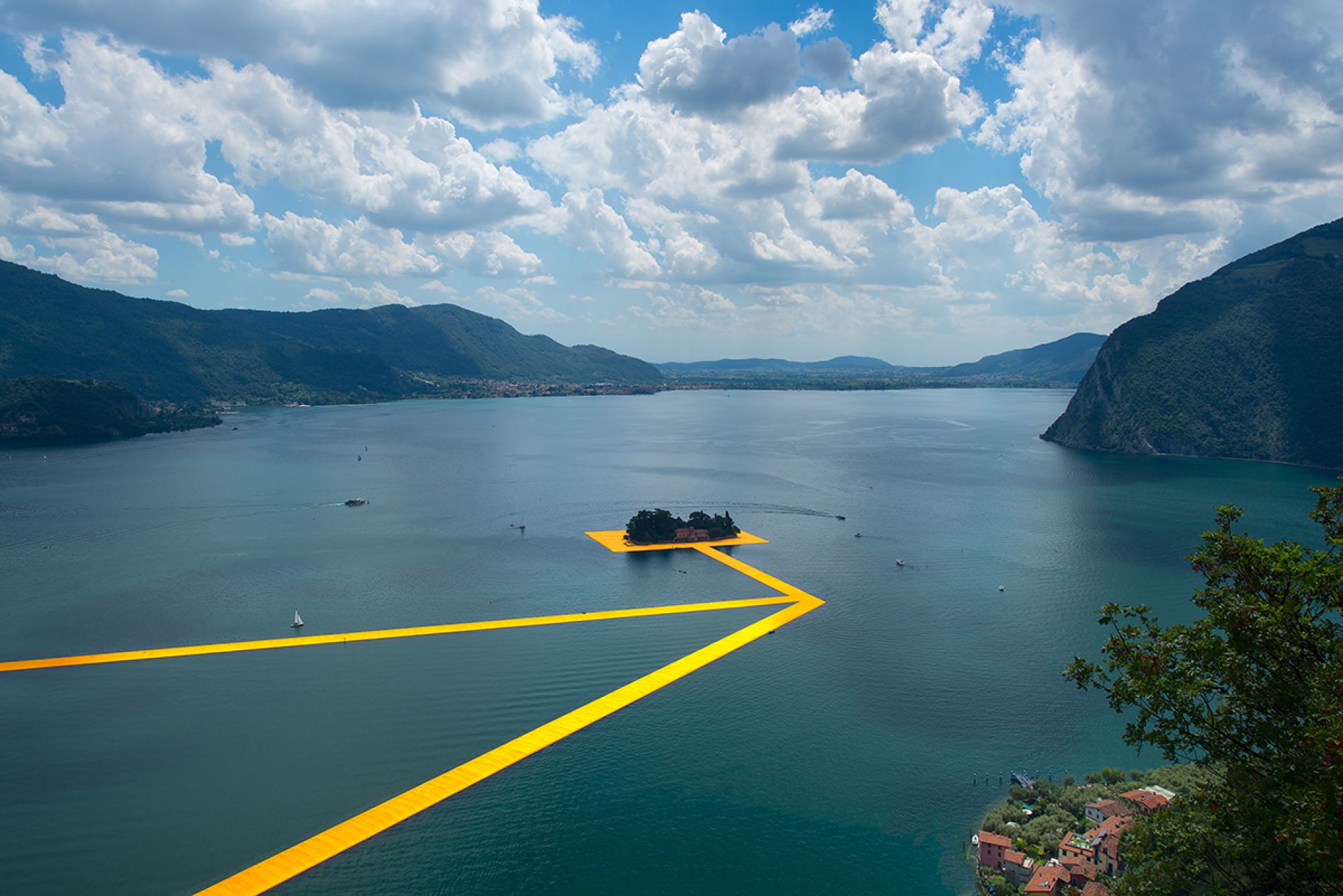 The Floating Piers: Artist Christo helps people to walk on water in ...