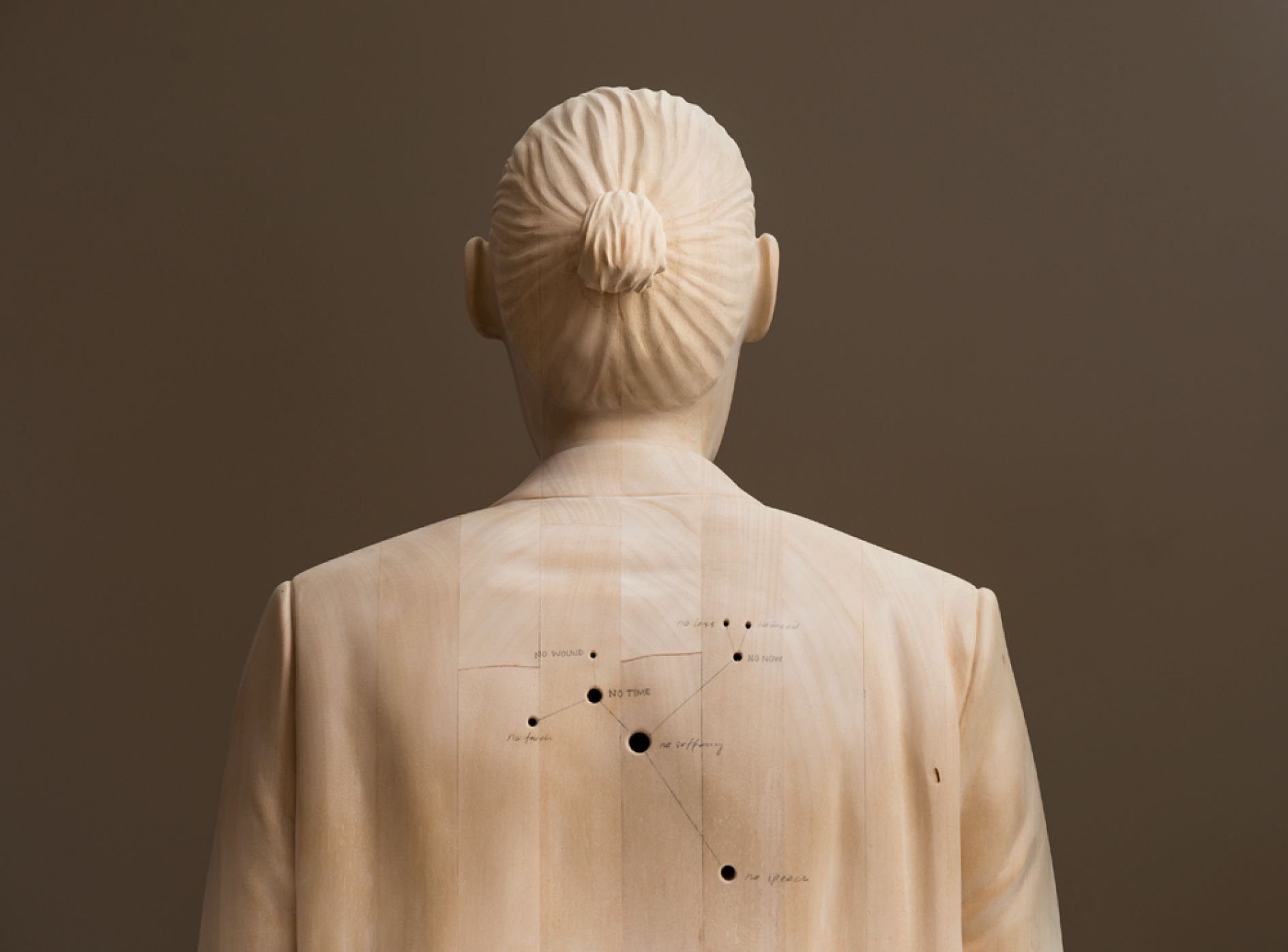 Wooden sculptures of twisted human forms by artist Paul Kaptein ...