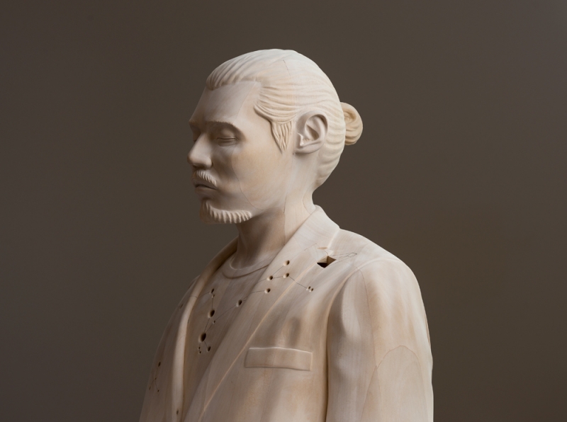 Wooden sculptures of twisted human forms by artist Paul Kaptein ...