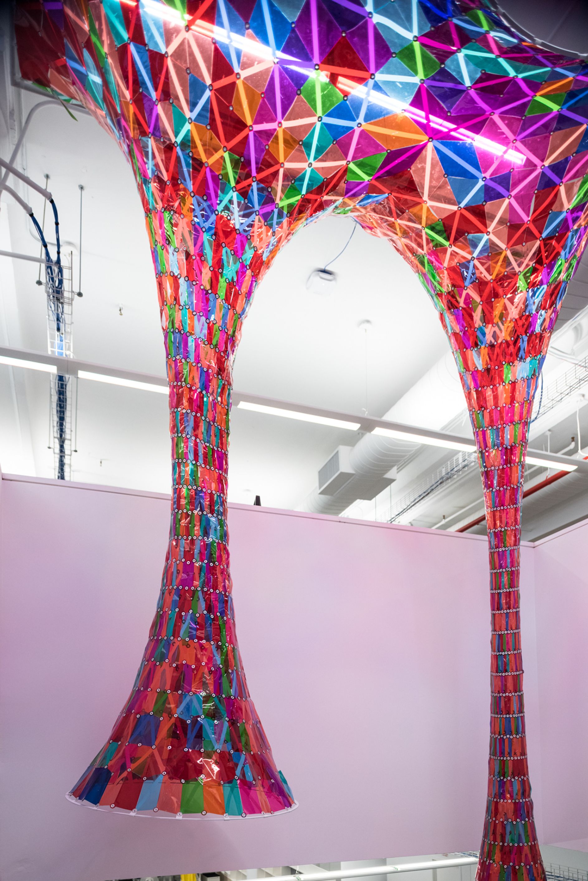 Stain glass art installation that hangs through two floors of Behance's ...