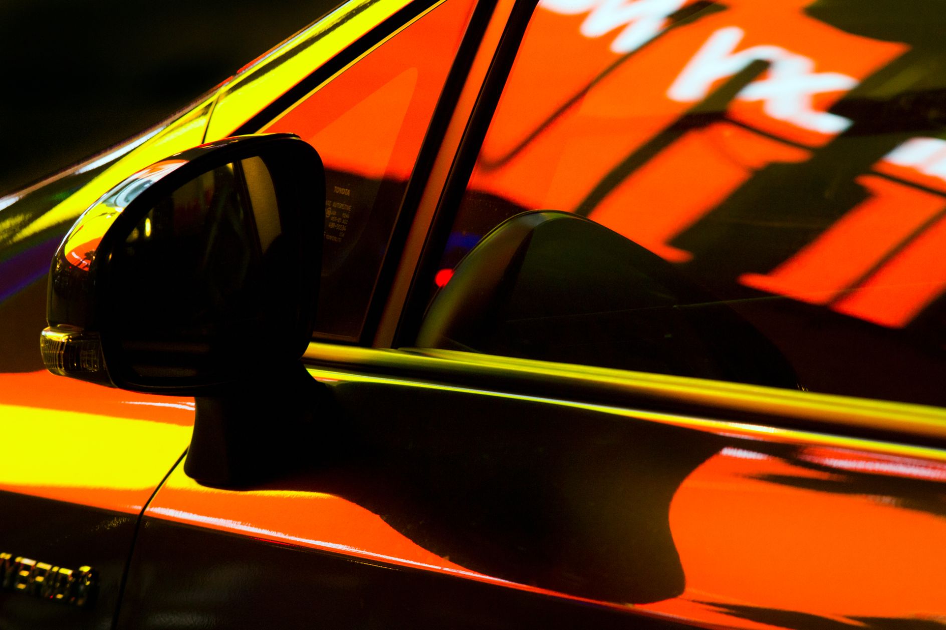 Nick Turpin's photographs of shiny cars reflecting the brightly-lit ...