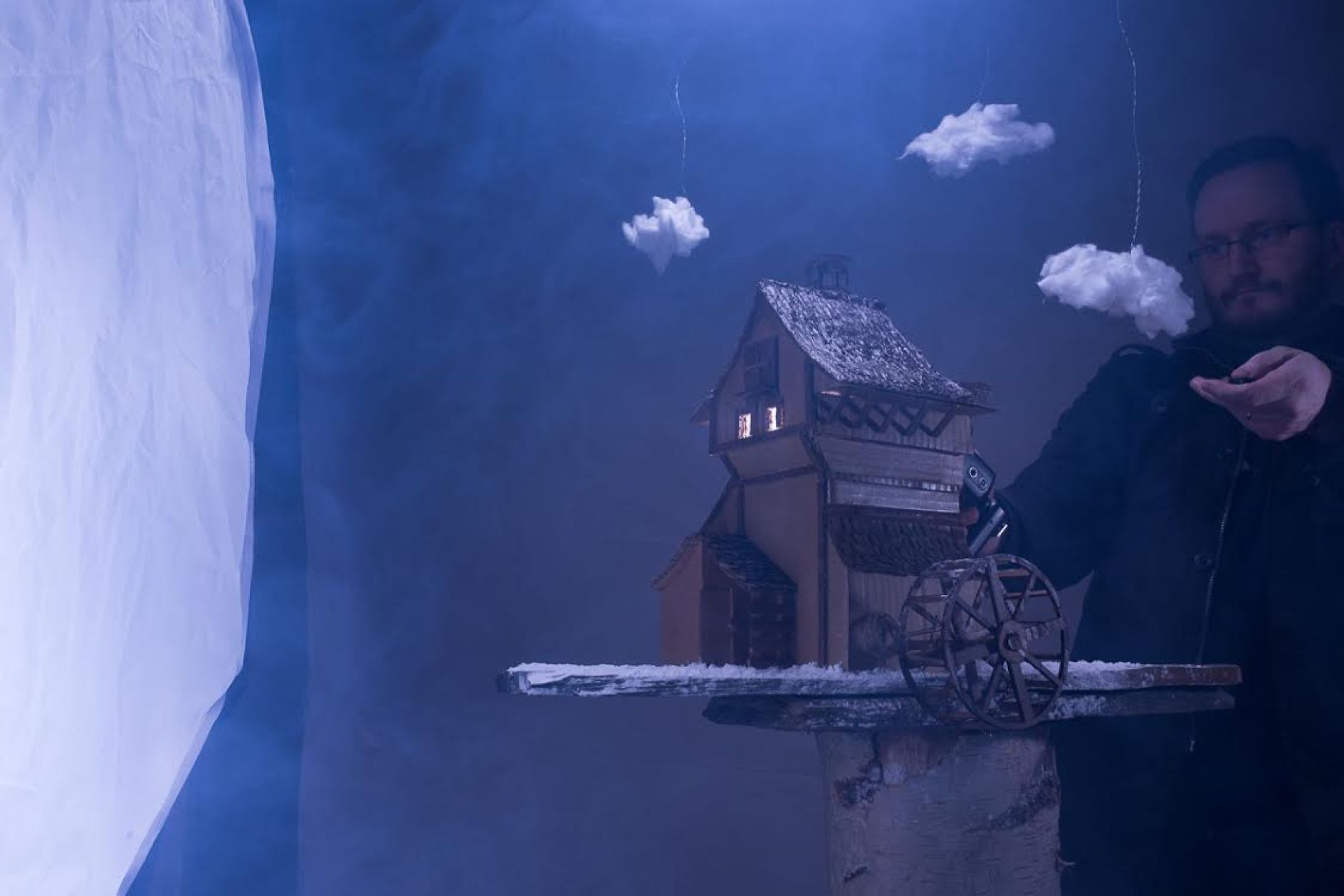 Miniature cardboard models that are photographed to look like the real ...