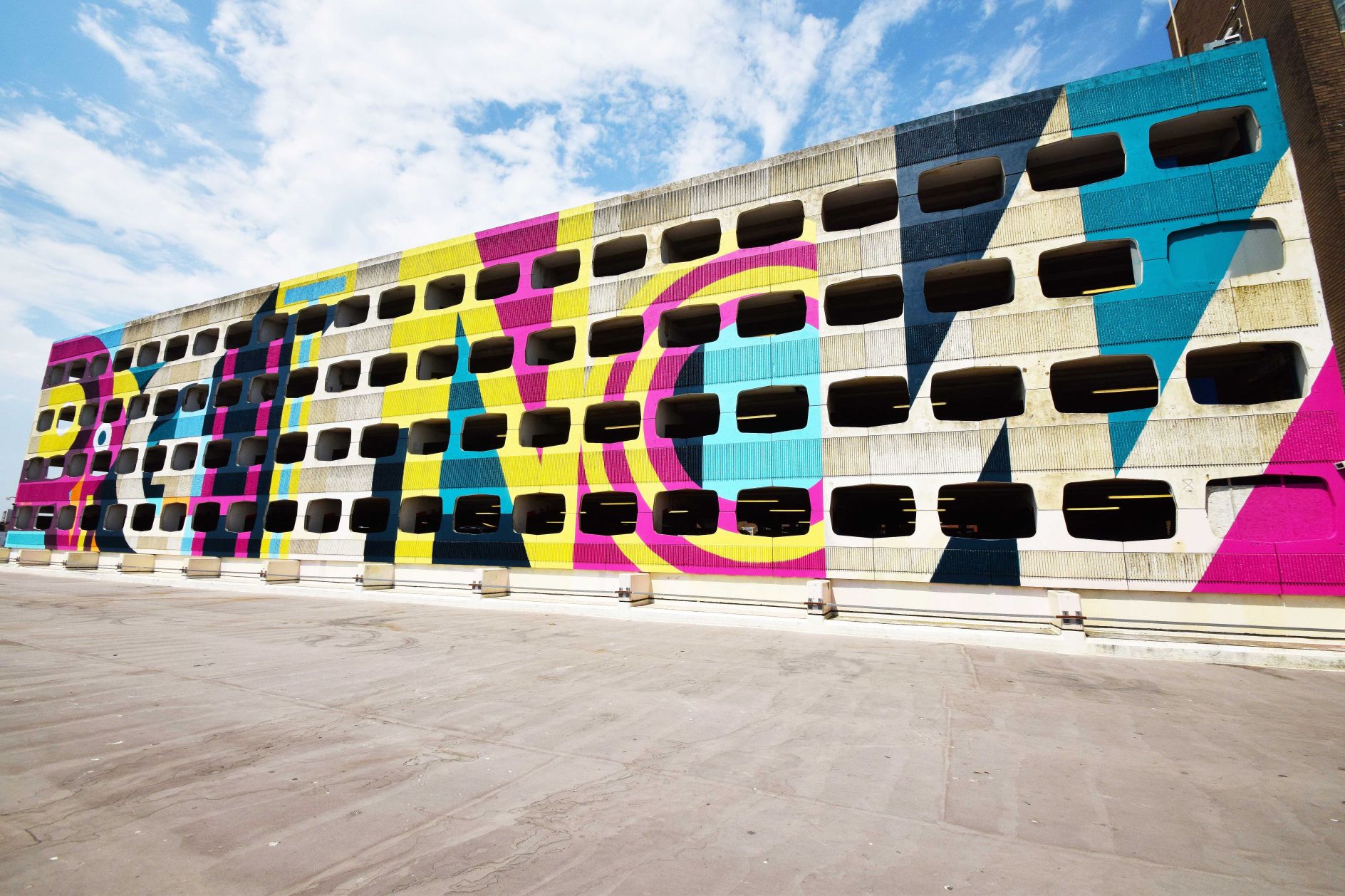 Street artist Ricky Also paints huge seaside-inspired mural on a ...