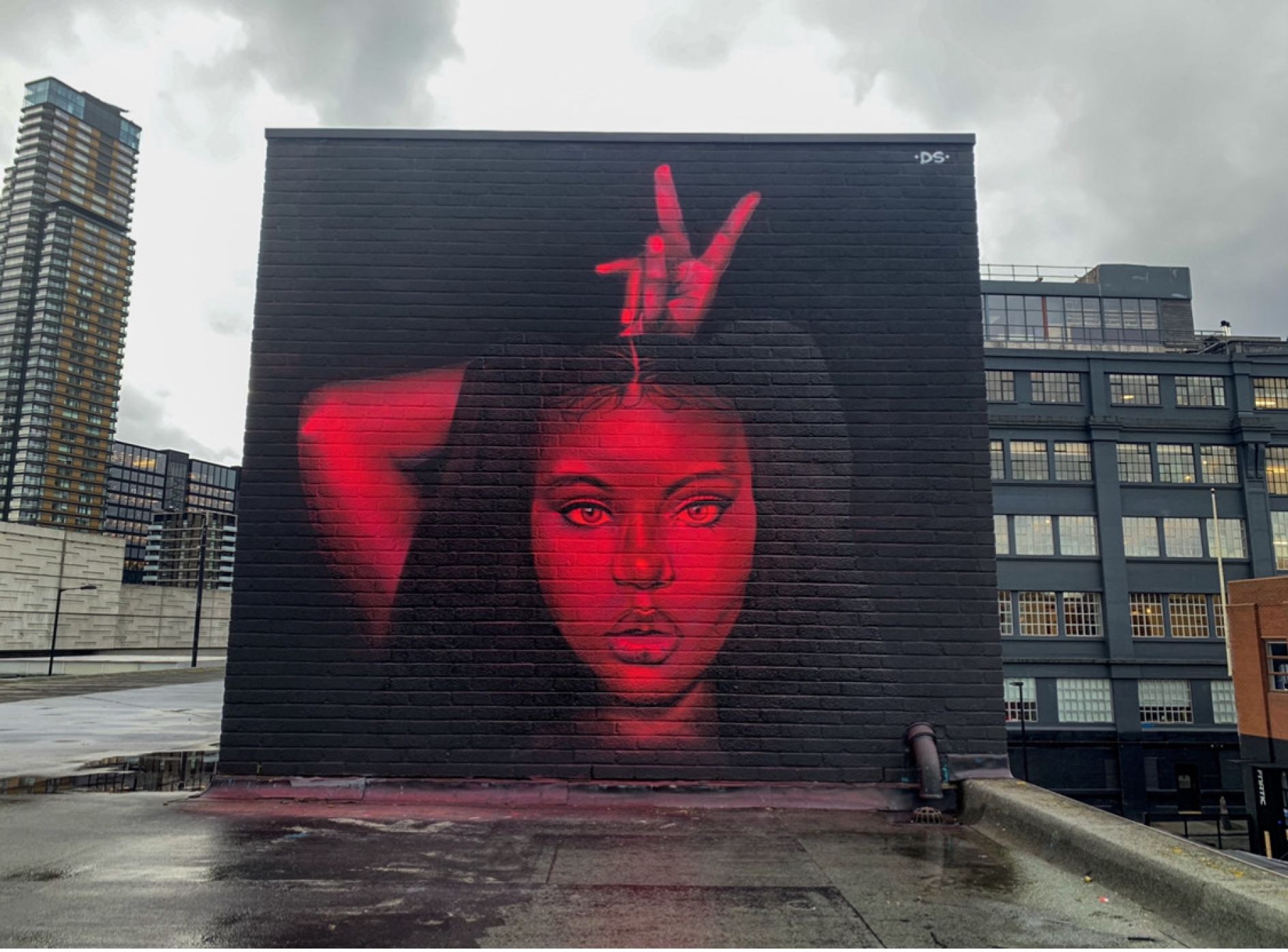 Artist David Speed paints 100 neon portraits on a Shoreditch rooftop ...