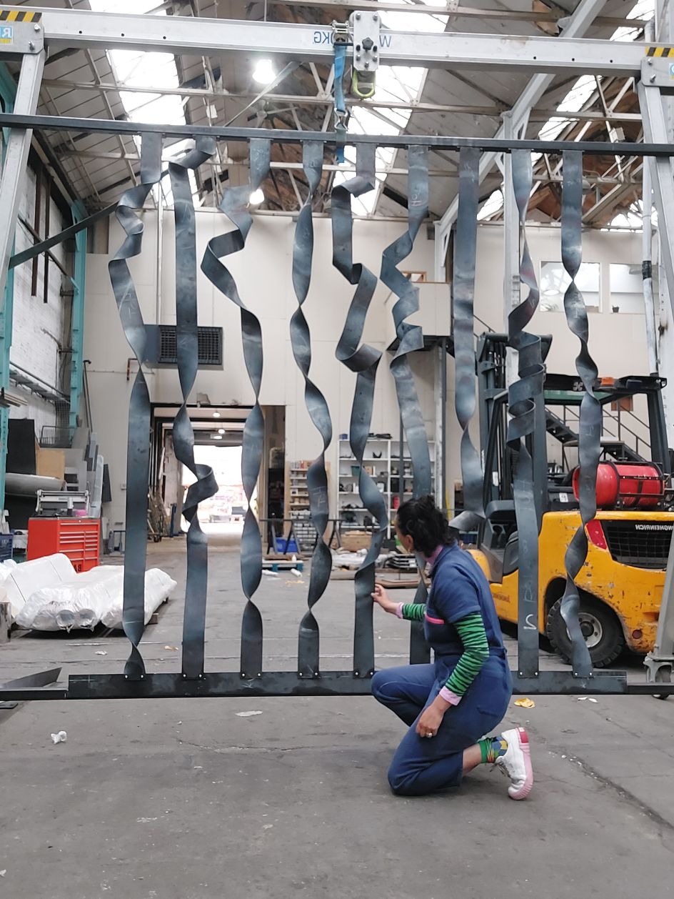 A new sculpture of rainbow-coloured ribbons is amazingly made of steel ...