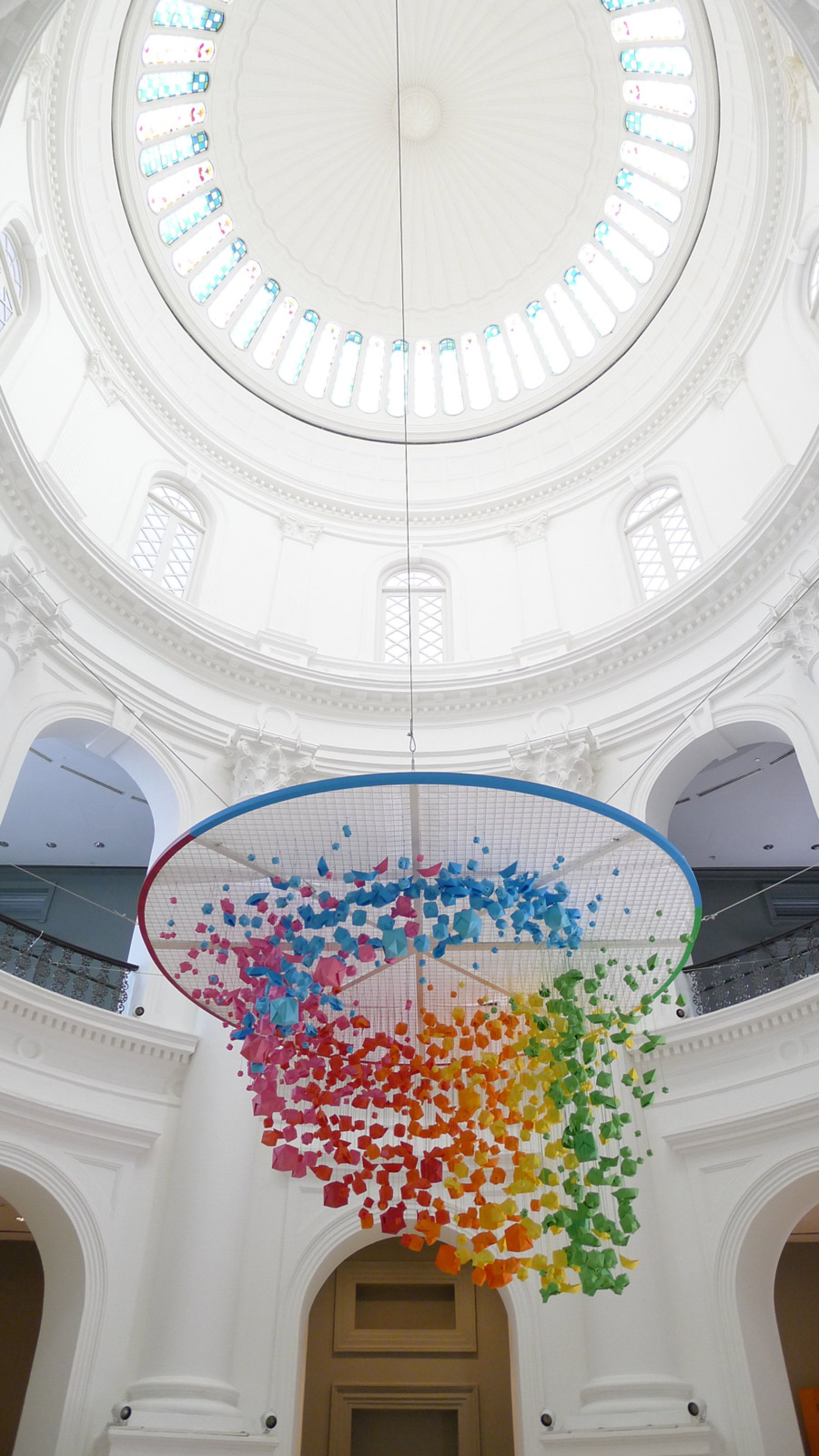 Giant, rainbow hanging installation of 1,000 origami spheres, fish and ...