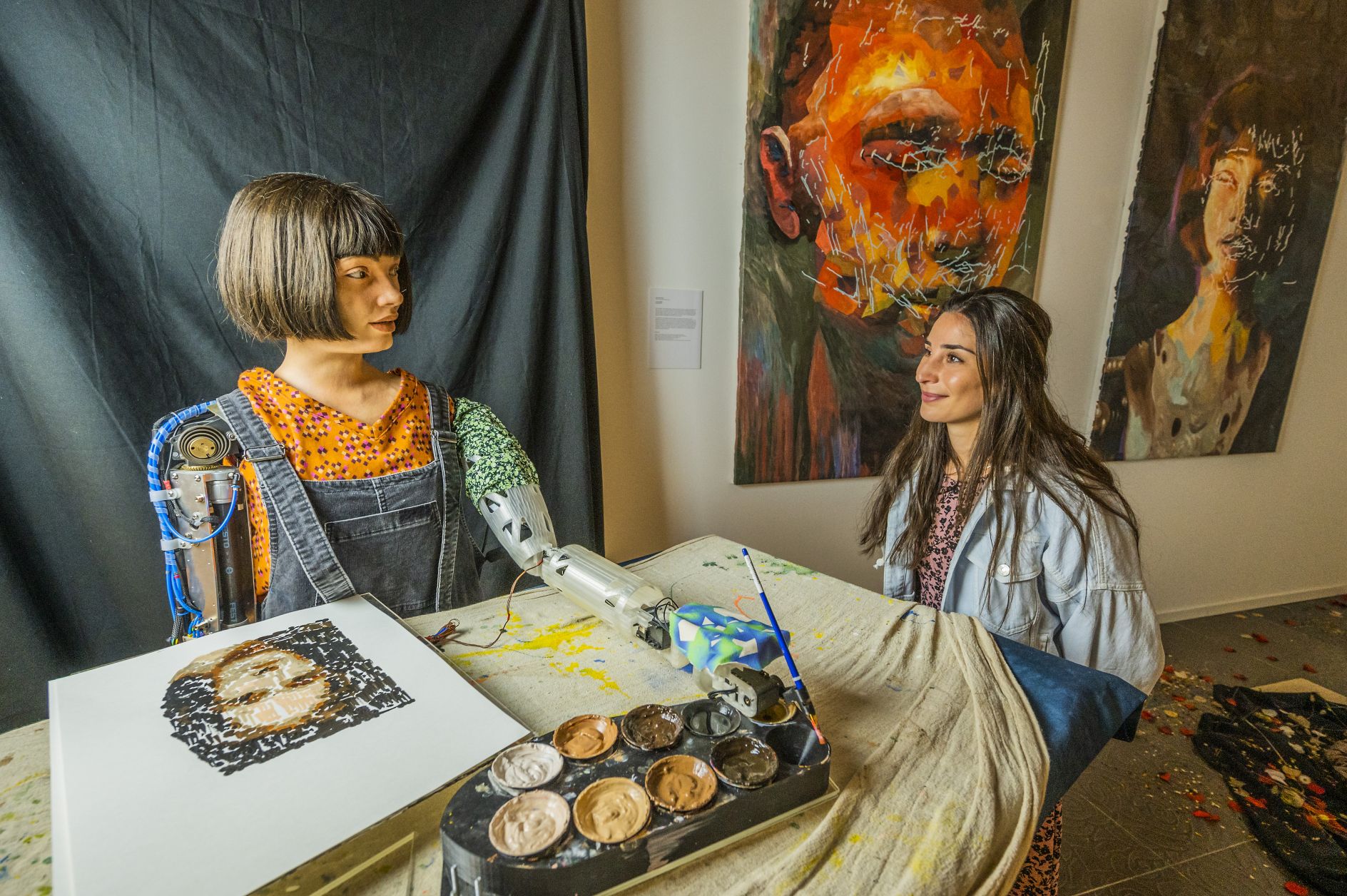 The world's first robot artist reveals amazing new paintings in its ...