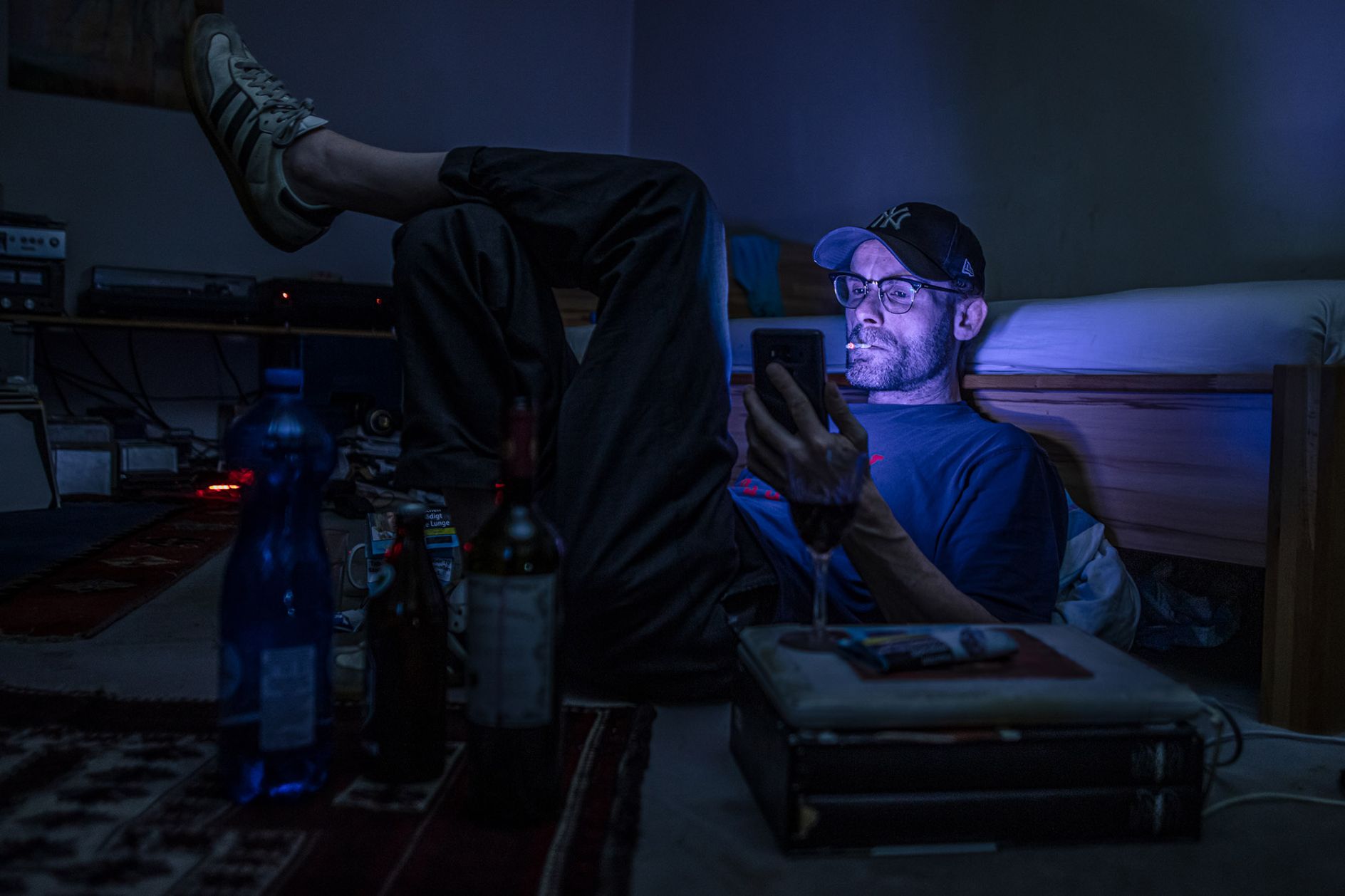 Portraits of people in lockdown with their faces illuminated by their ...