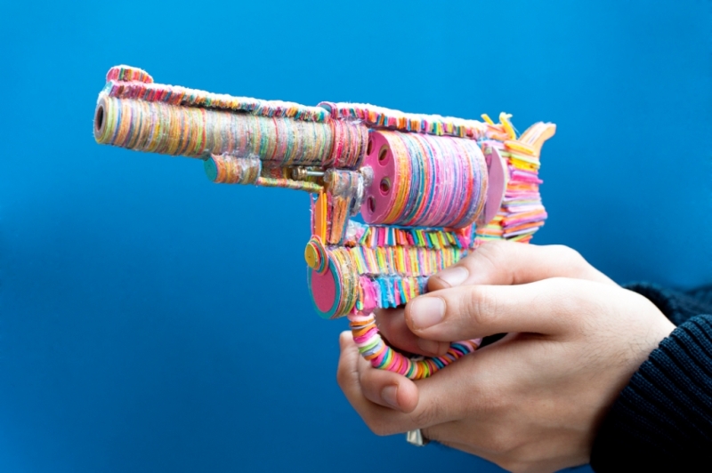 Artist crafts colourful weapon sculptures out of tens of thousands of ...