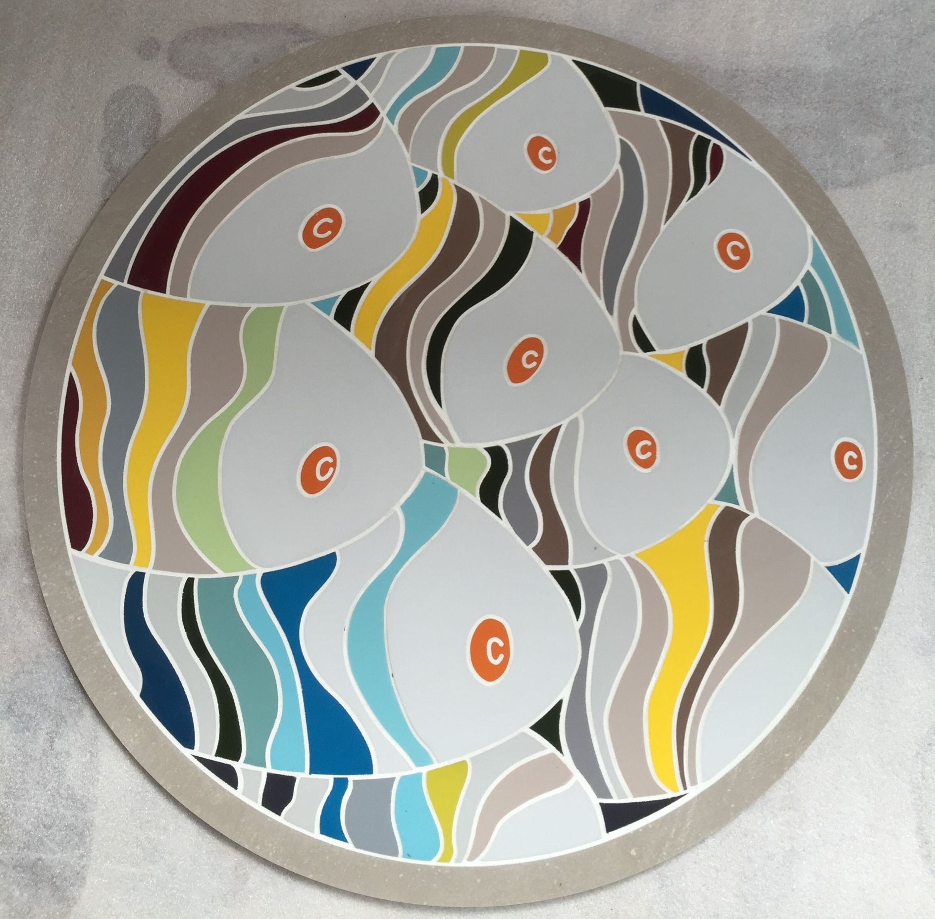 Intense waterjet pump transforms plain coloured tiles into psychedelic ...