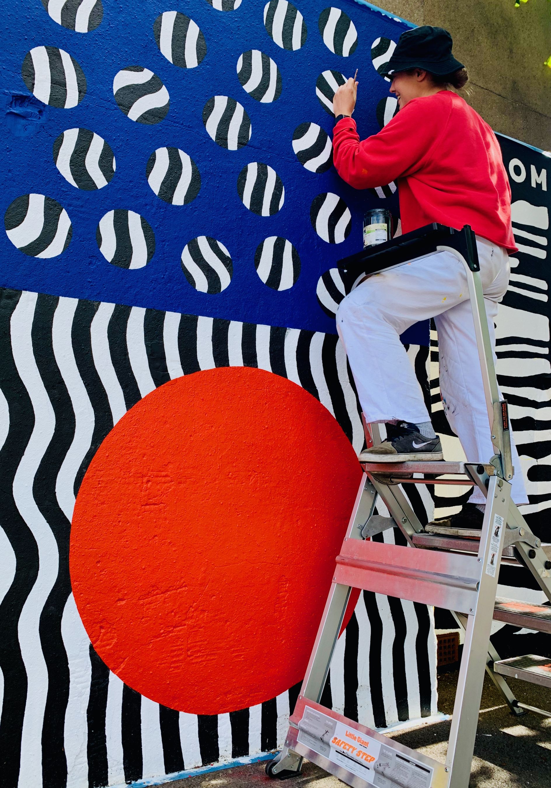 Artist Coco Lom celebrates Hackney's community spirit in 30-foot mural ...