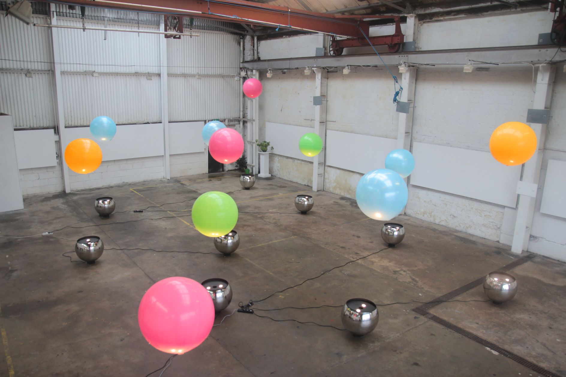 Interactive installation that lets you play with giant colourful orbs ...