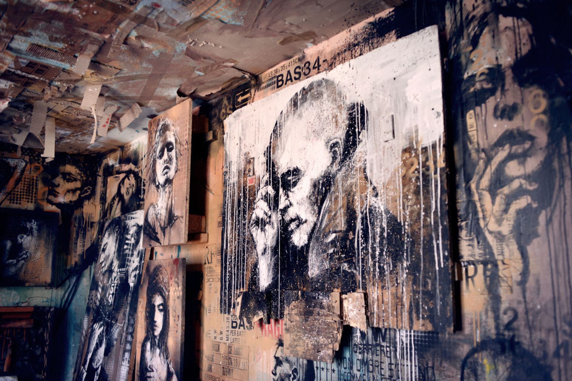 Artist fills a derelict apartment with portraits that pay homage to its ...