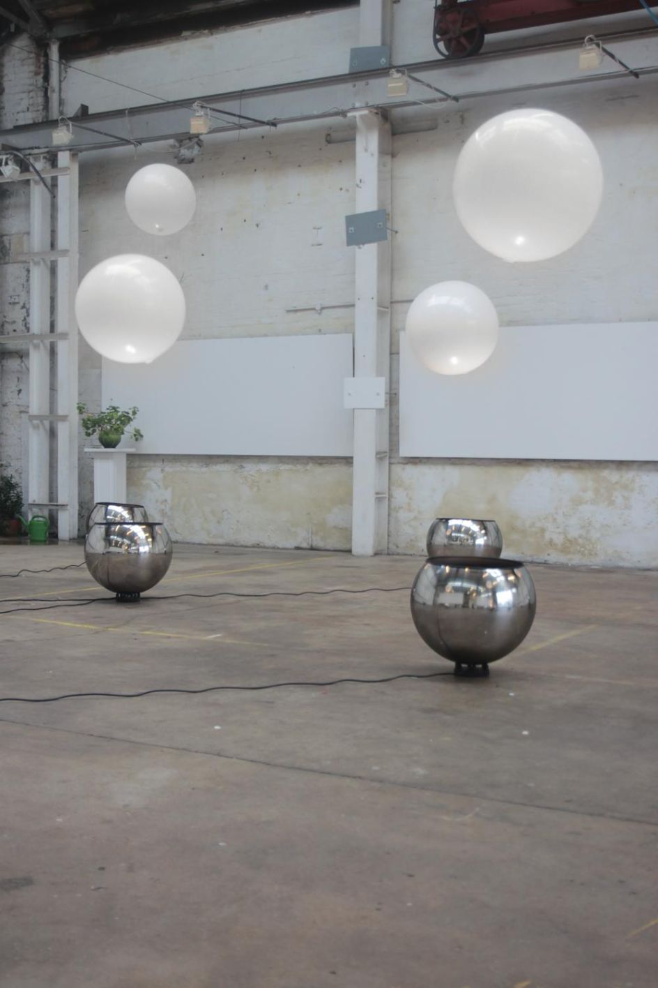 Interactive installation that lets you play with giant colourful orbs ...