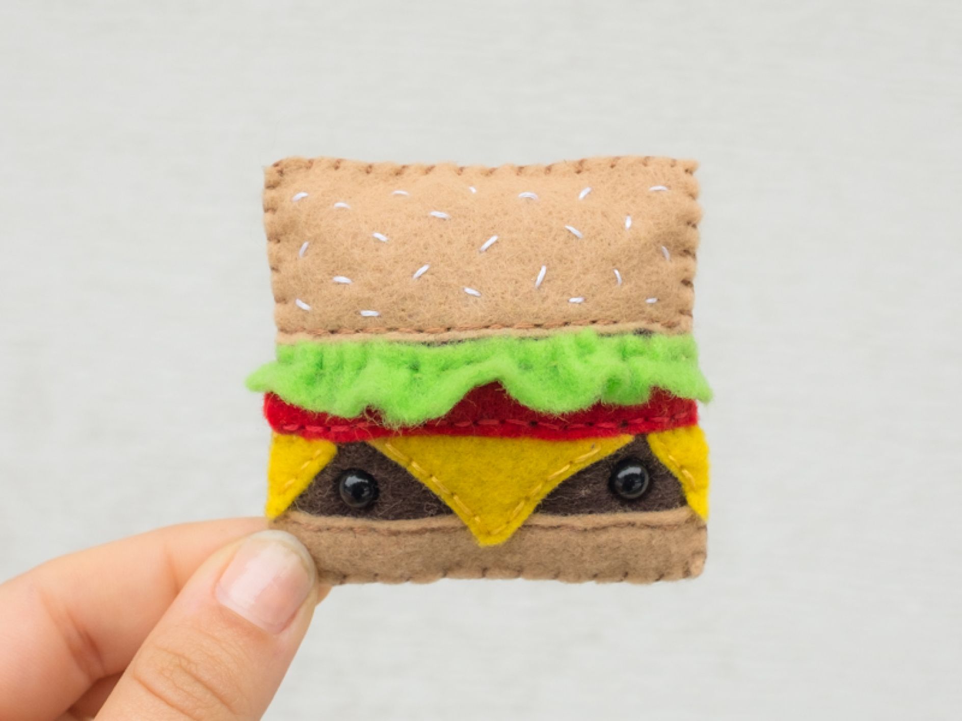 Felt Faces: Artist Becky Margraf crafts 100 little faces for 100 ...