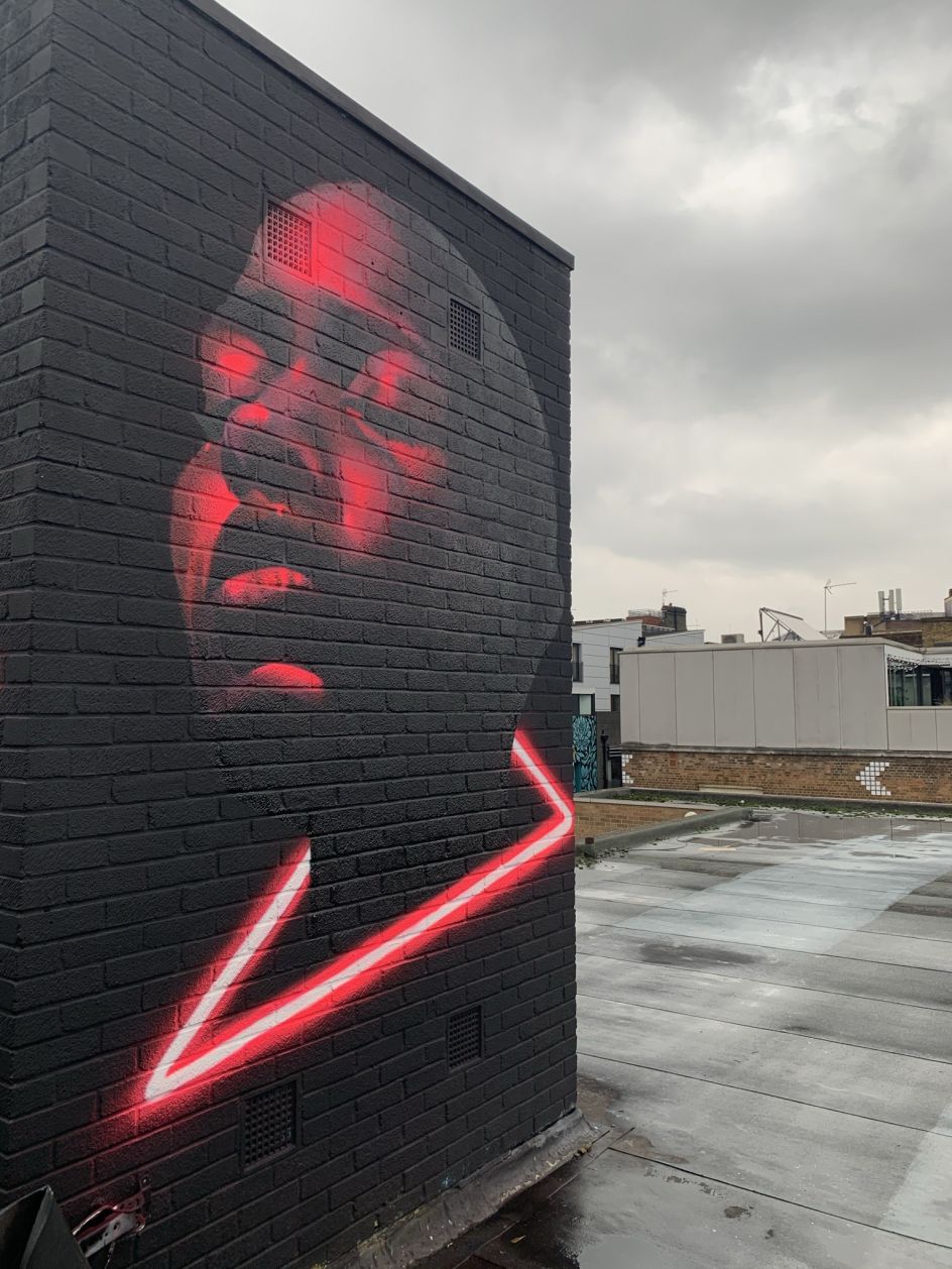 Artist David Speed paints 100 neon portraits on a Shoreditch rooftop ...
