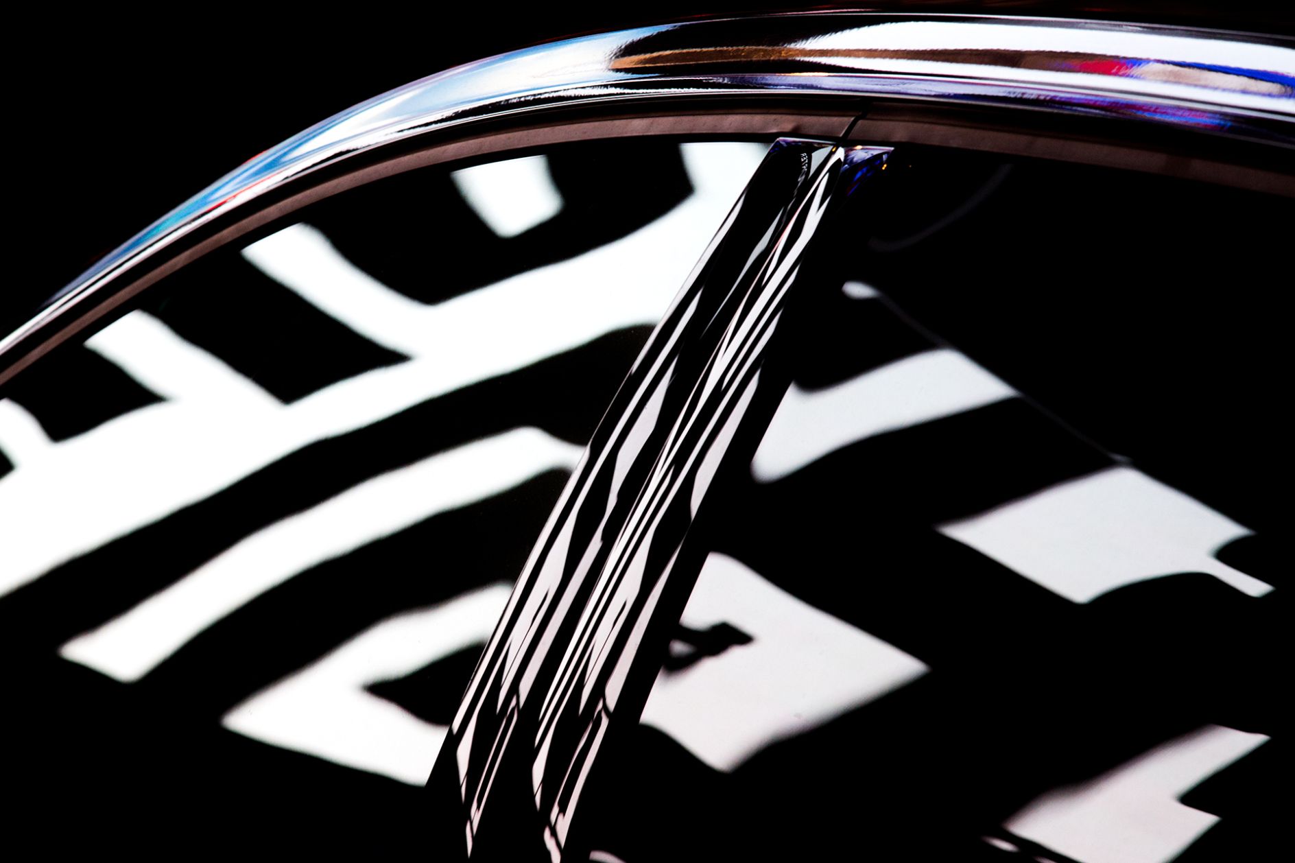 Nick Turpin's photographs of shiny cars reflecting the brightly-lit ...