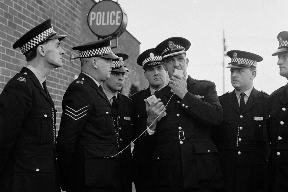 No sirens or truncheons here: a minimal identity design for the ...