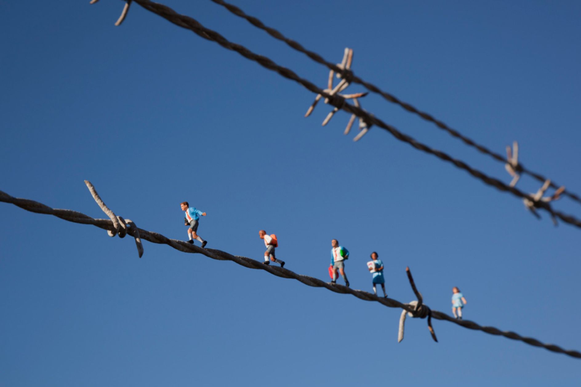 A global model village with miniature people at your feet, captured on ...