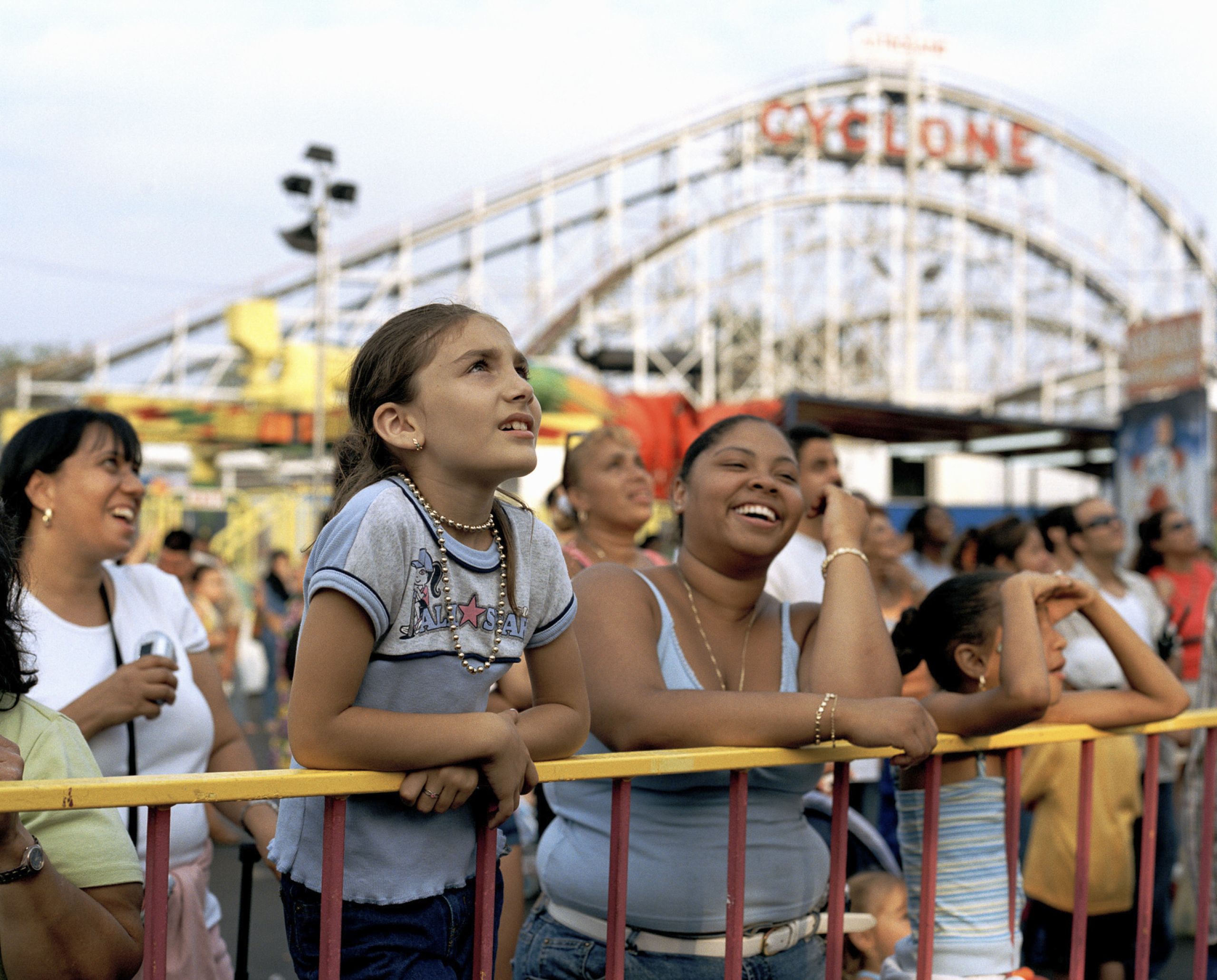 Photographs by Sherrie Nickol of summer crowds in New York City remind ...