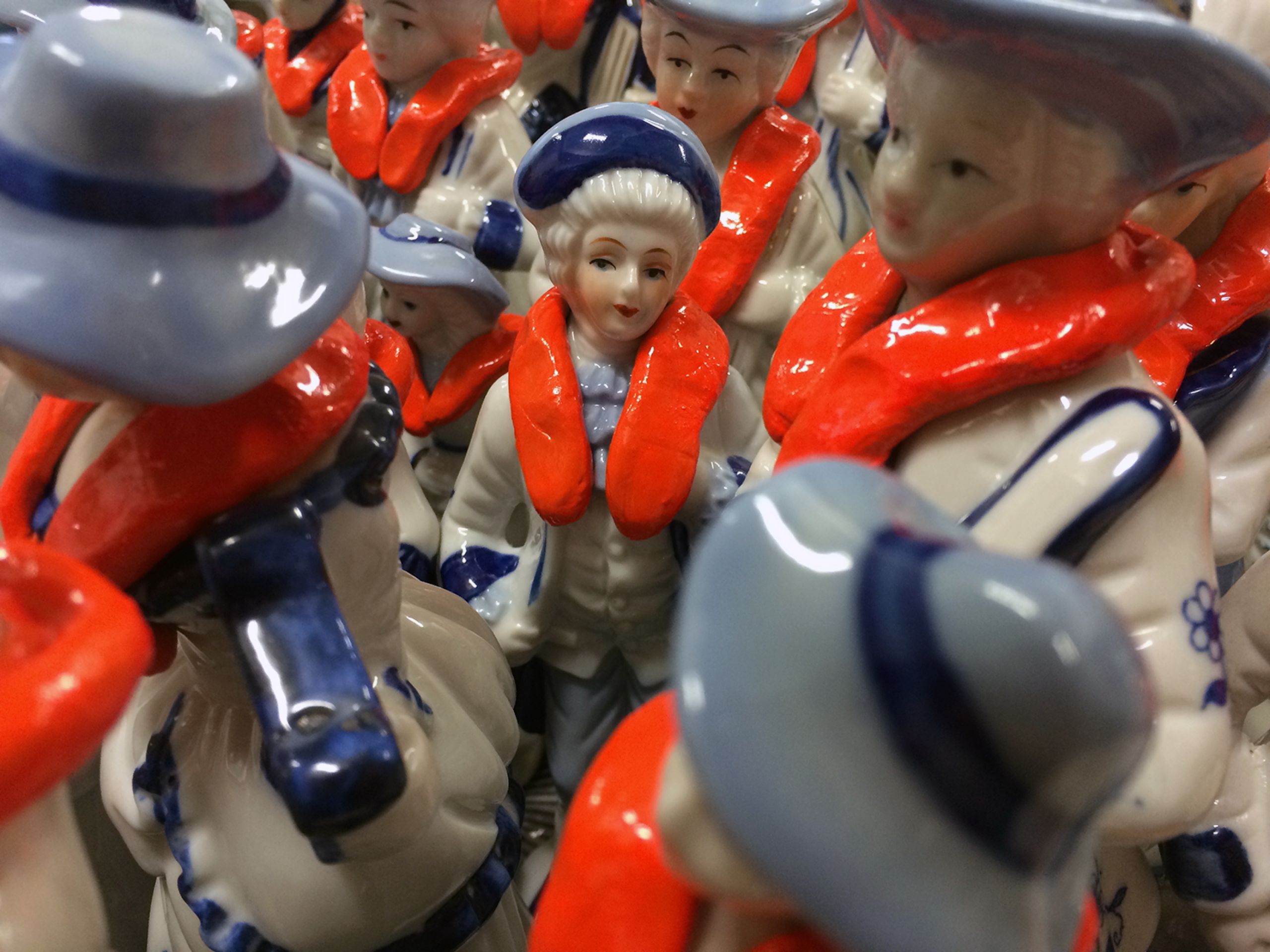 Artist clads vintage porcelain figurines in life jackets to highlight ...