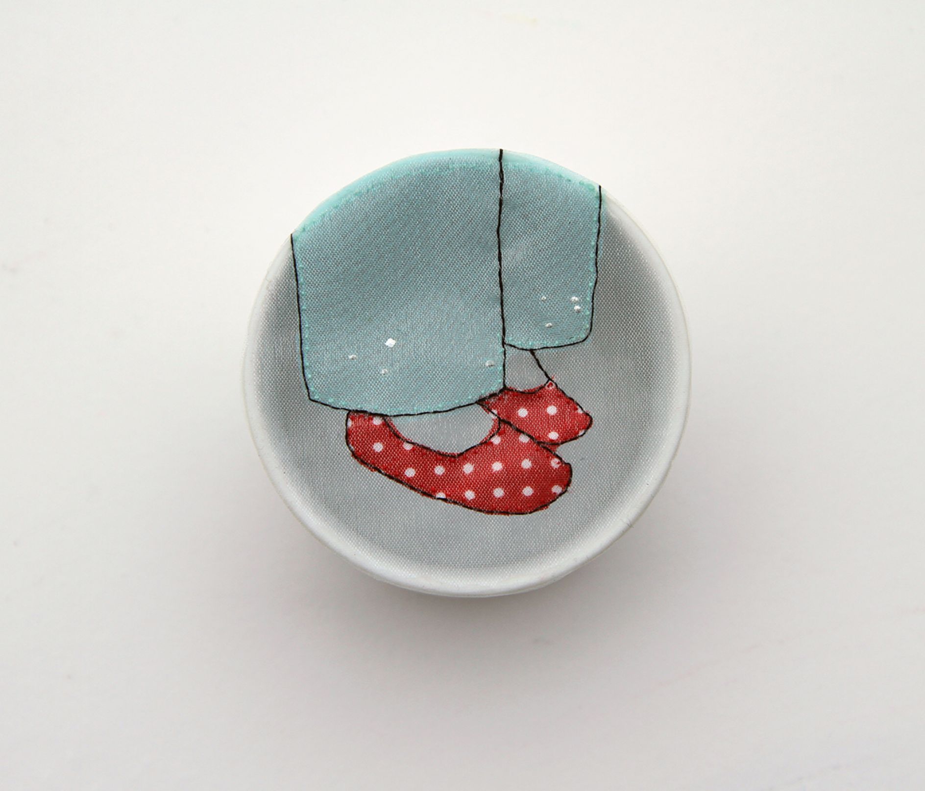 Artist combines ceramics with embroidered artwork to create delicate ...