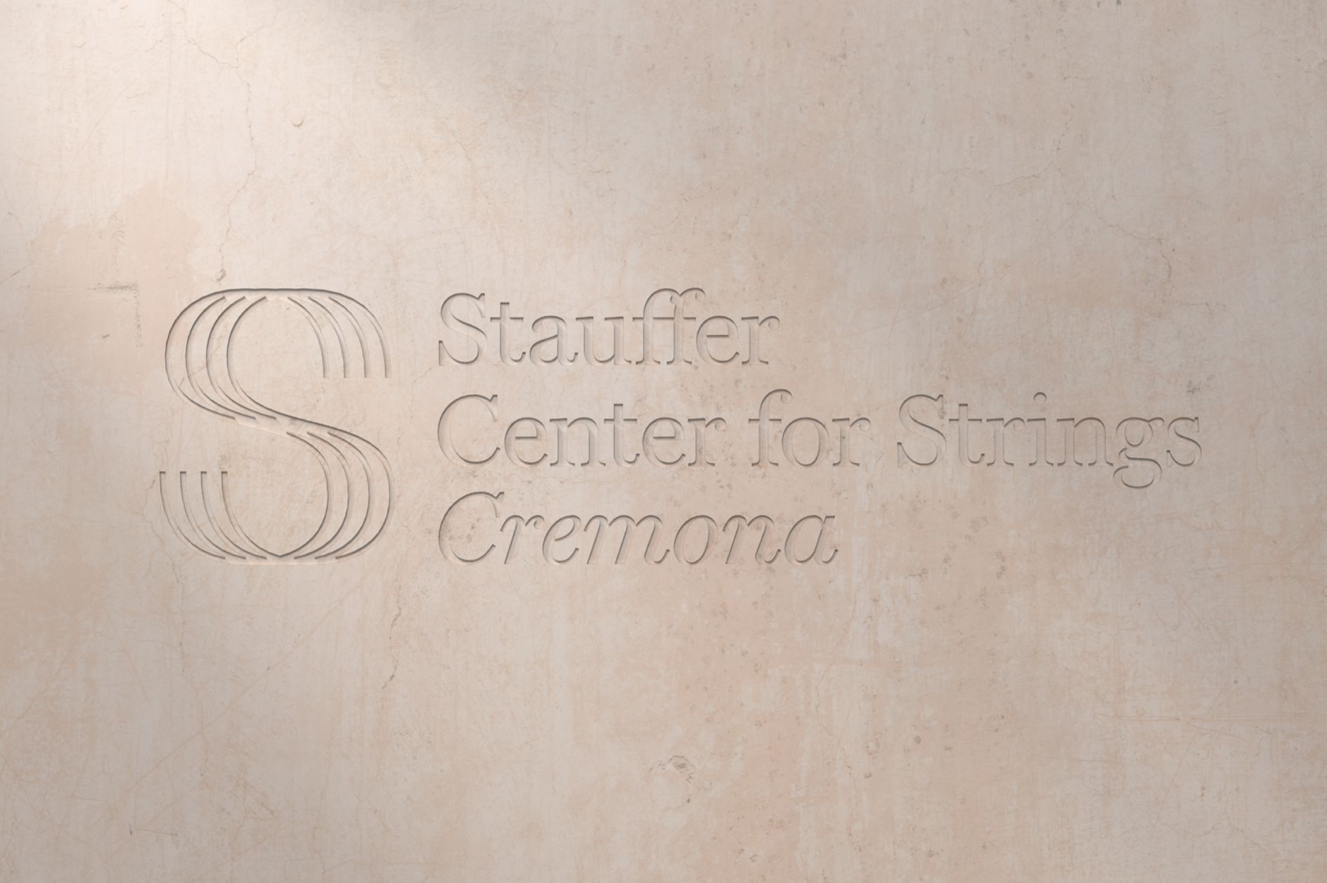 Pentagram's identity for The Stauffer Center for Strings plays on four ...