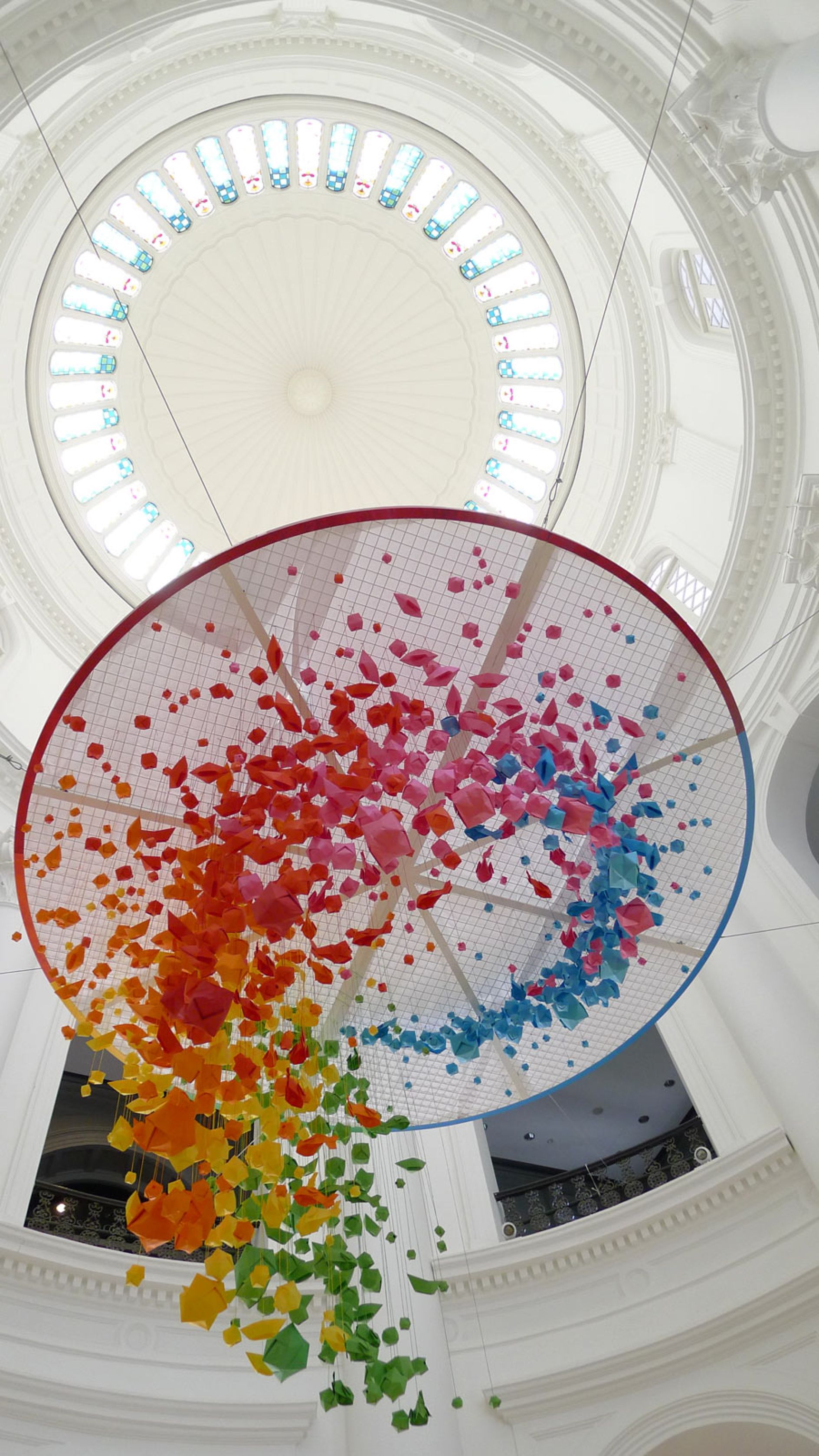 Giant, rainbow hanging installation of 1,000 origami spheres, fish and ...