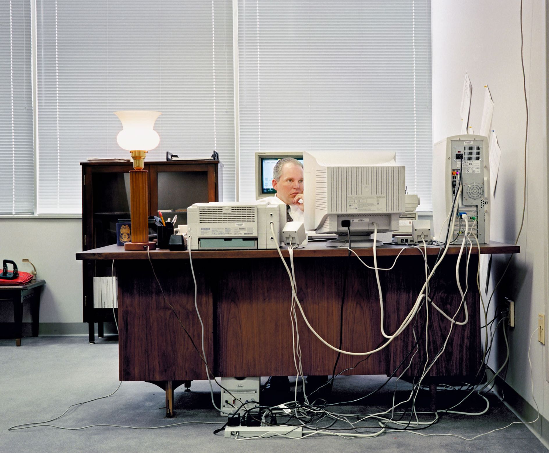 Photographs of office life before iPhones and Wi-Fi reveal not much has ...