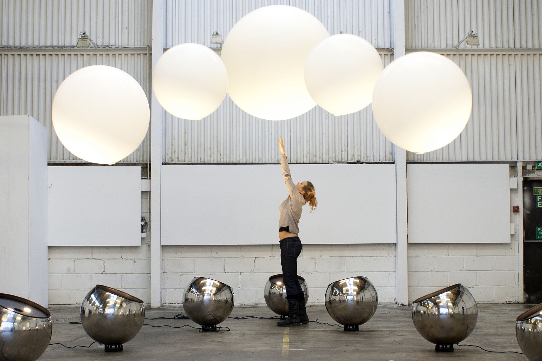Interactive installation that lets you play with giant colourful orbs ...