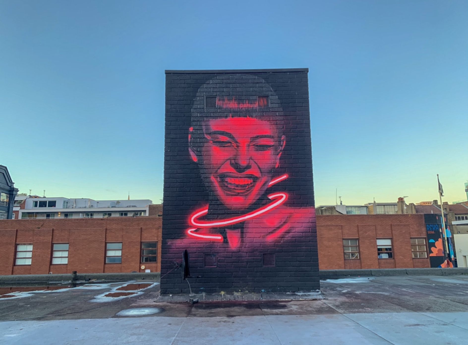 Artist David Speed paints 100 neon portraits on a Shoreditch rooftop ...