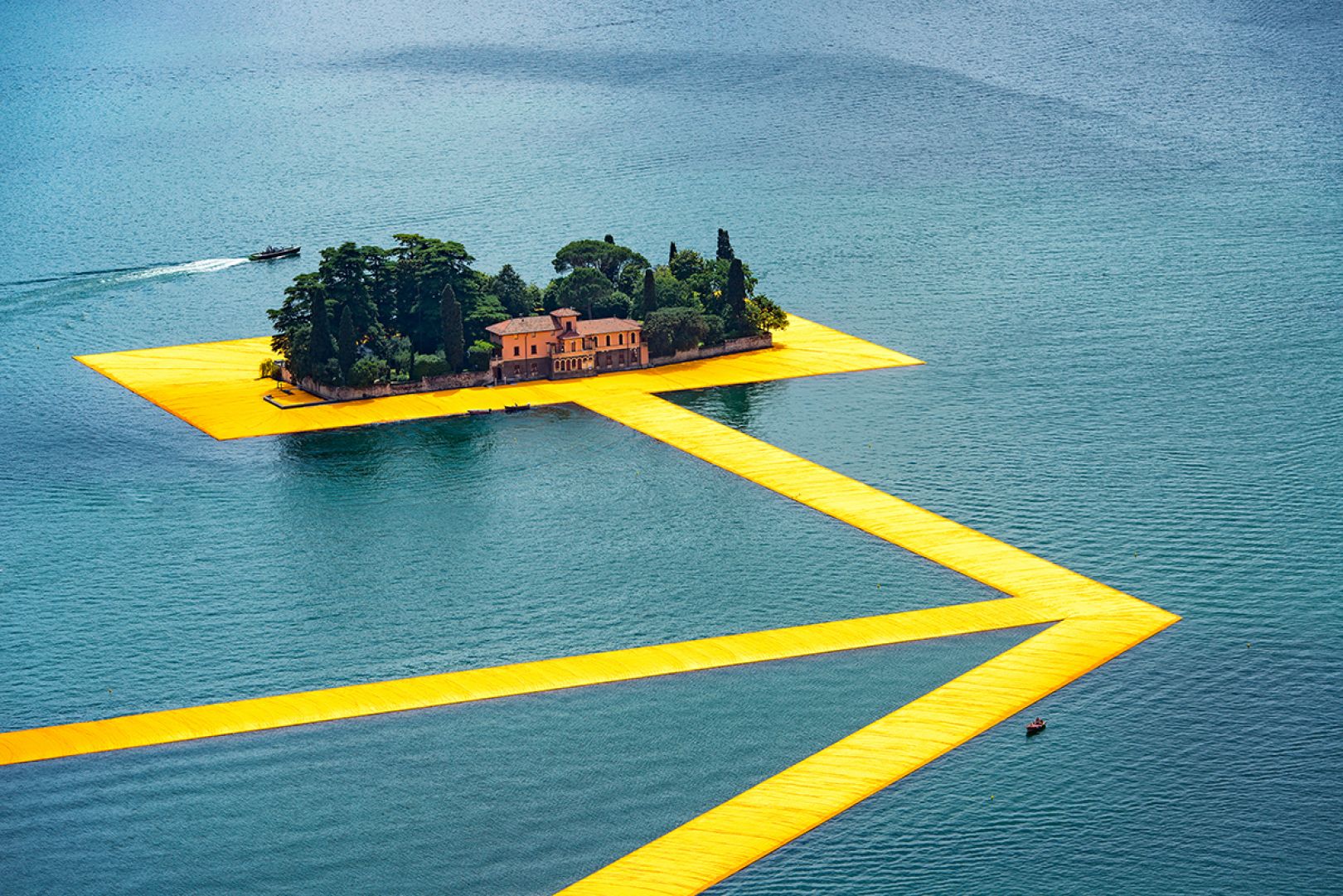 The Floating Piers: Artist Christo helps people to walk on water in ...