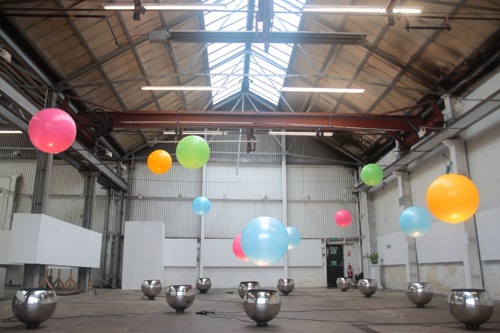 Interactive installation that lets you play with giant colourful orbs ...