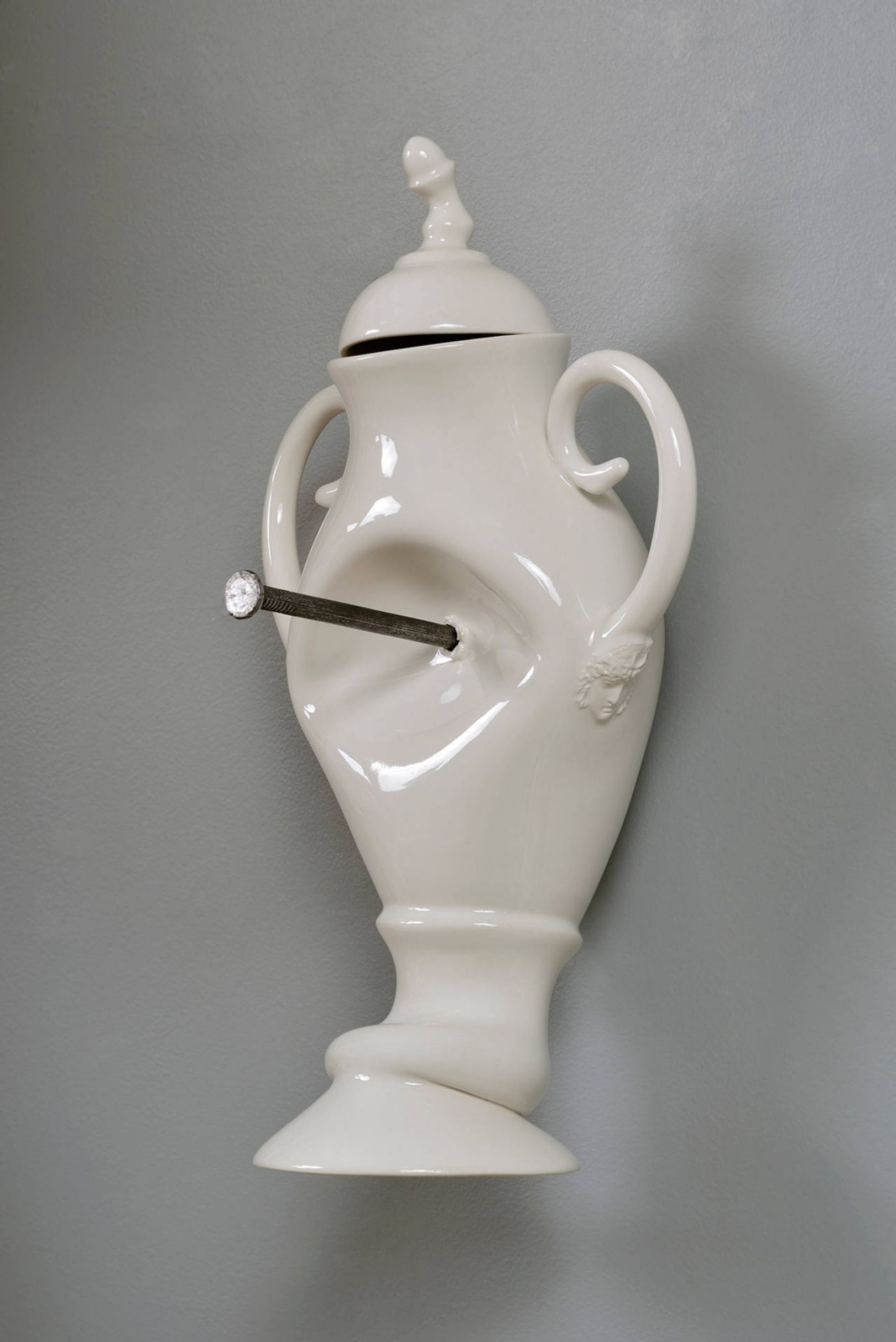 Abuse: Artist gets violent with porcelain to create beaten ...