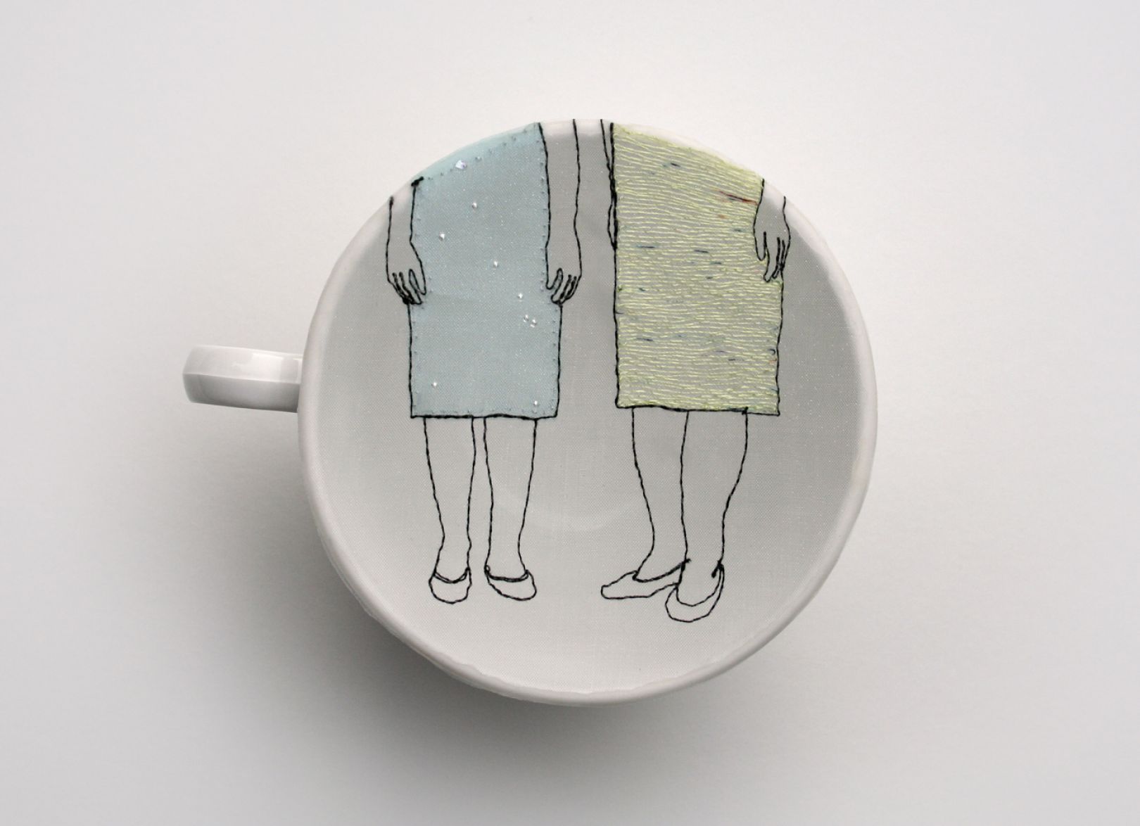 Artist combines ceramics with embroidered artwork to create delicate ...