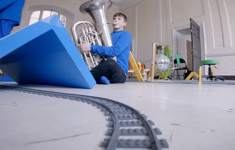 A one-shot music video filmed from the view of a toy train as it speeds ...