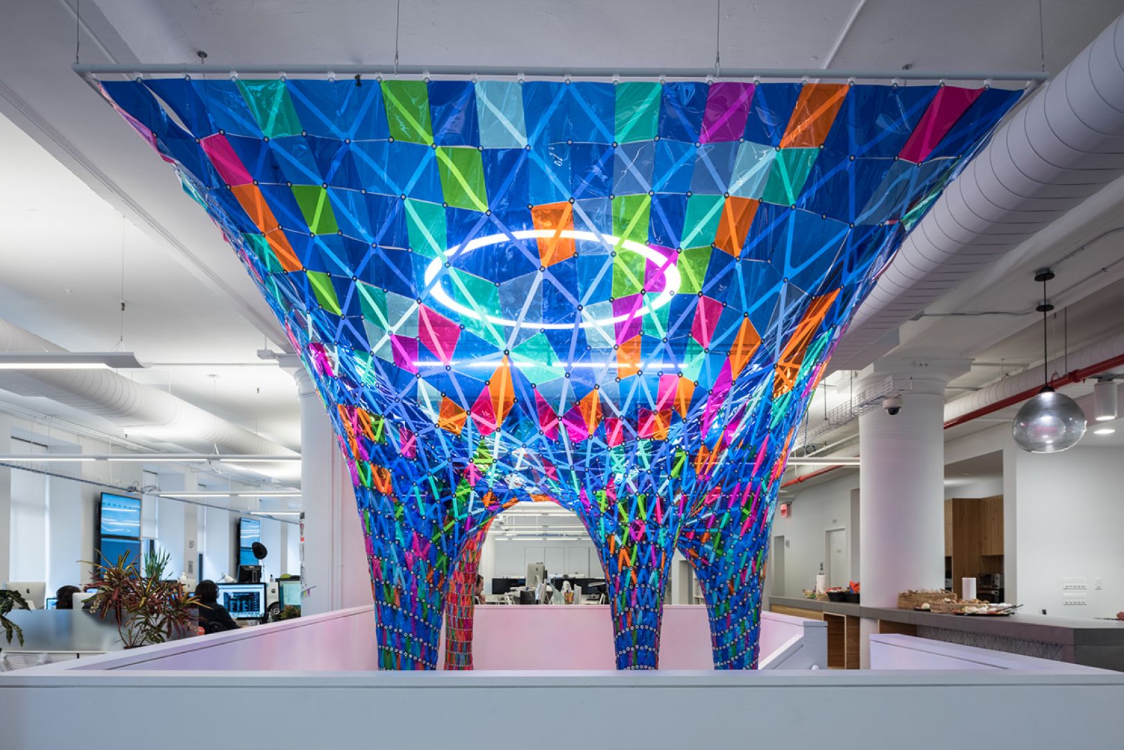 Stain glass art installation that hangs through two floors of Behance's ...